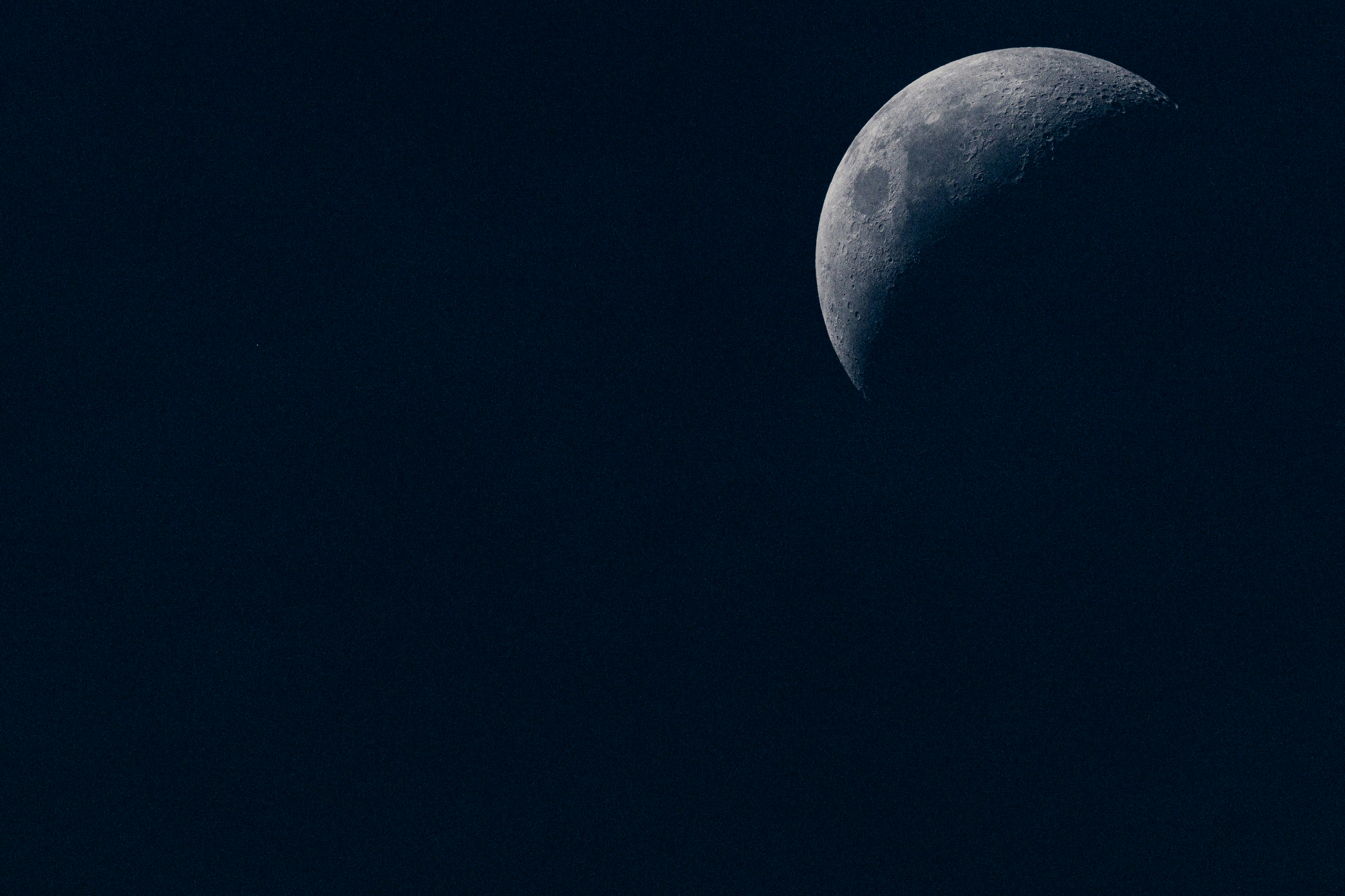 Lone Moon Dawn in a Quiet Night Sky