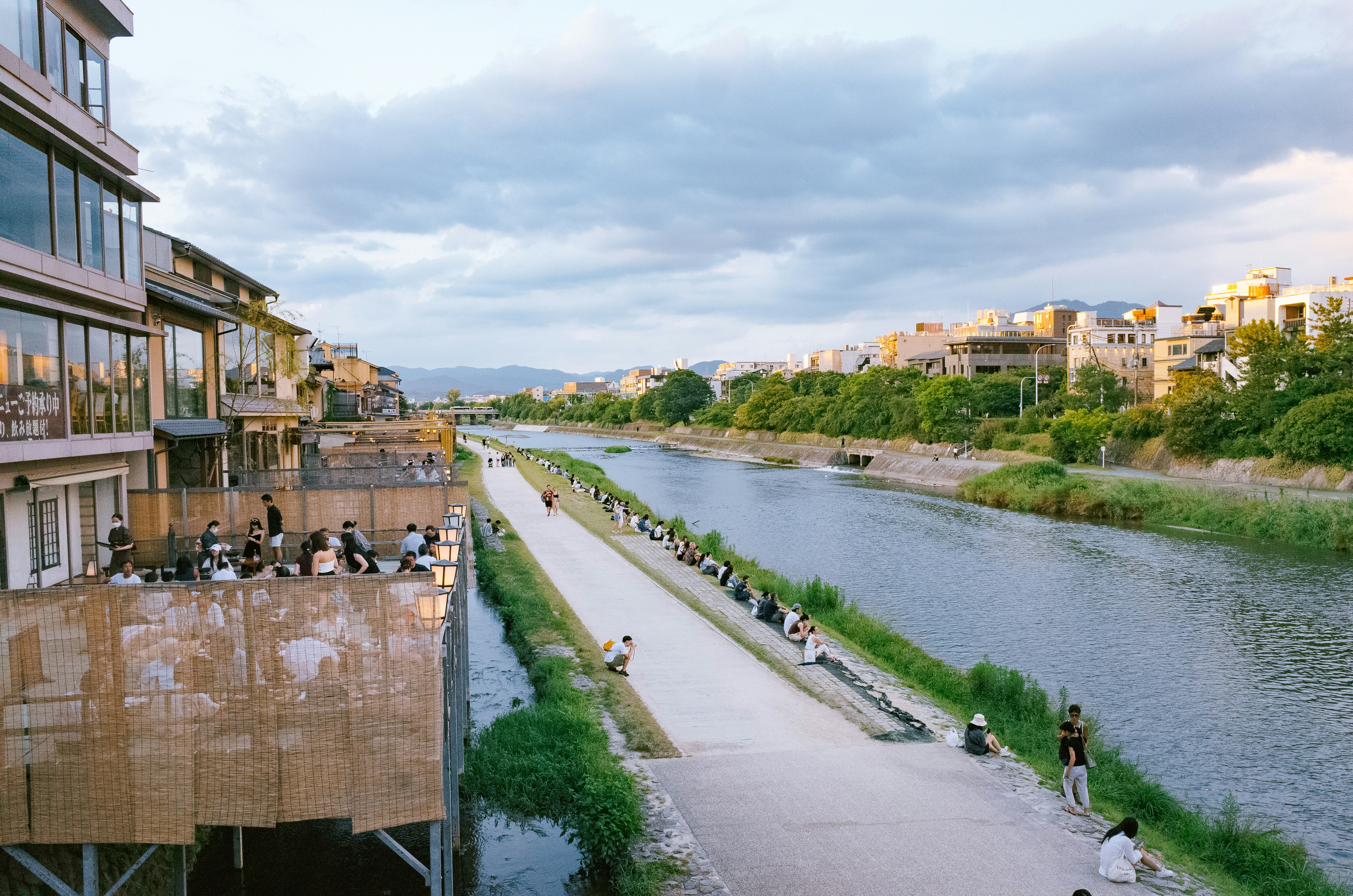 Riverside Terrace: People, Planks, and Quiet Flow