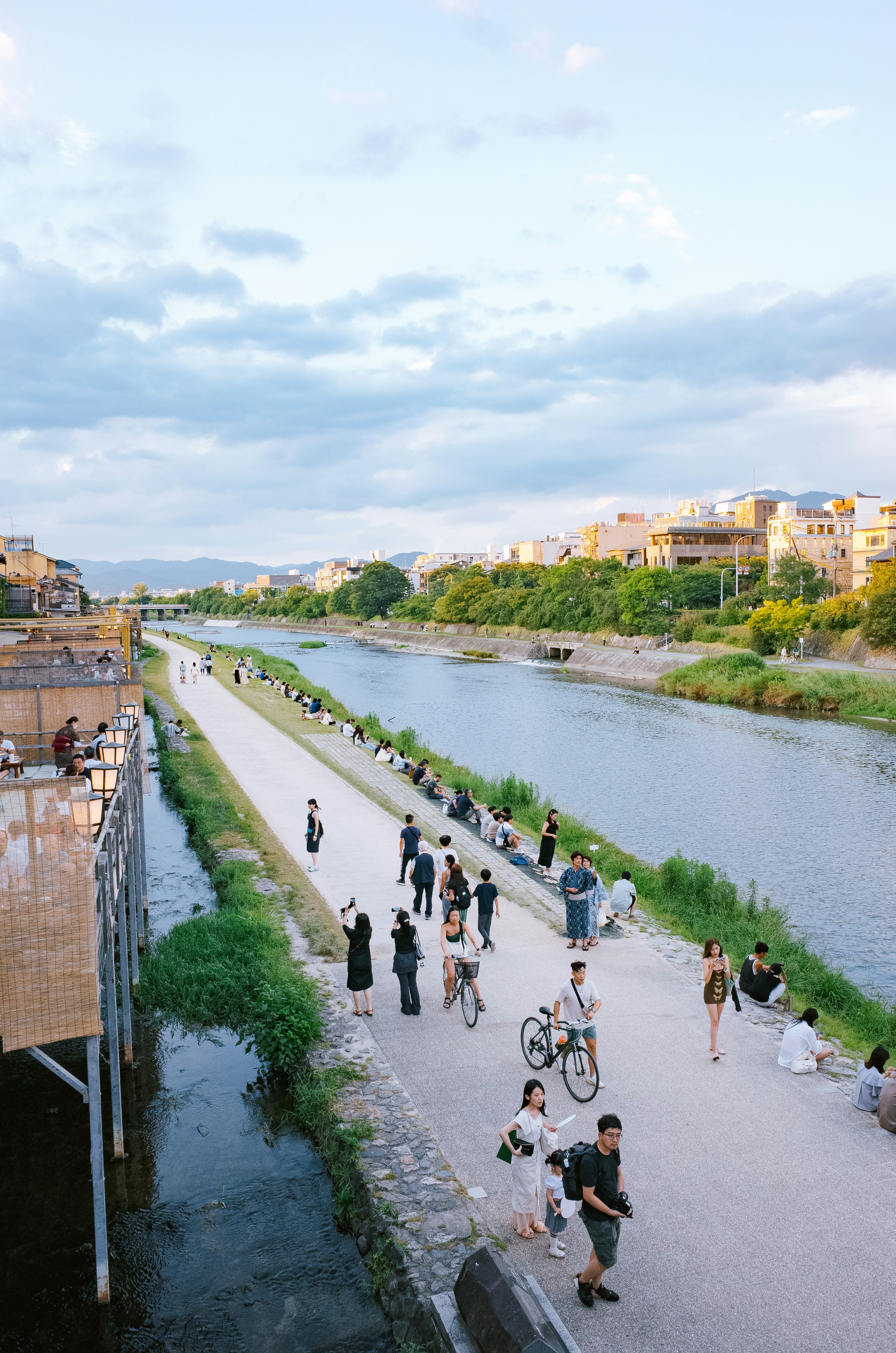 Riverside Pathway: People, Pedals, and the Quiet City