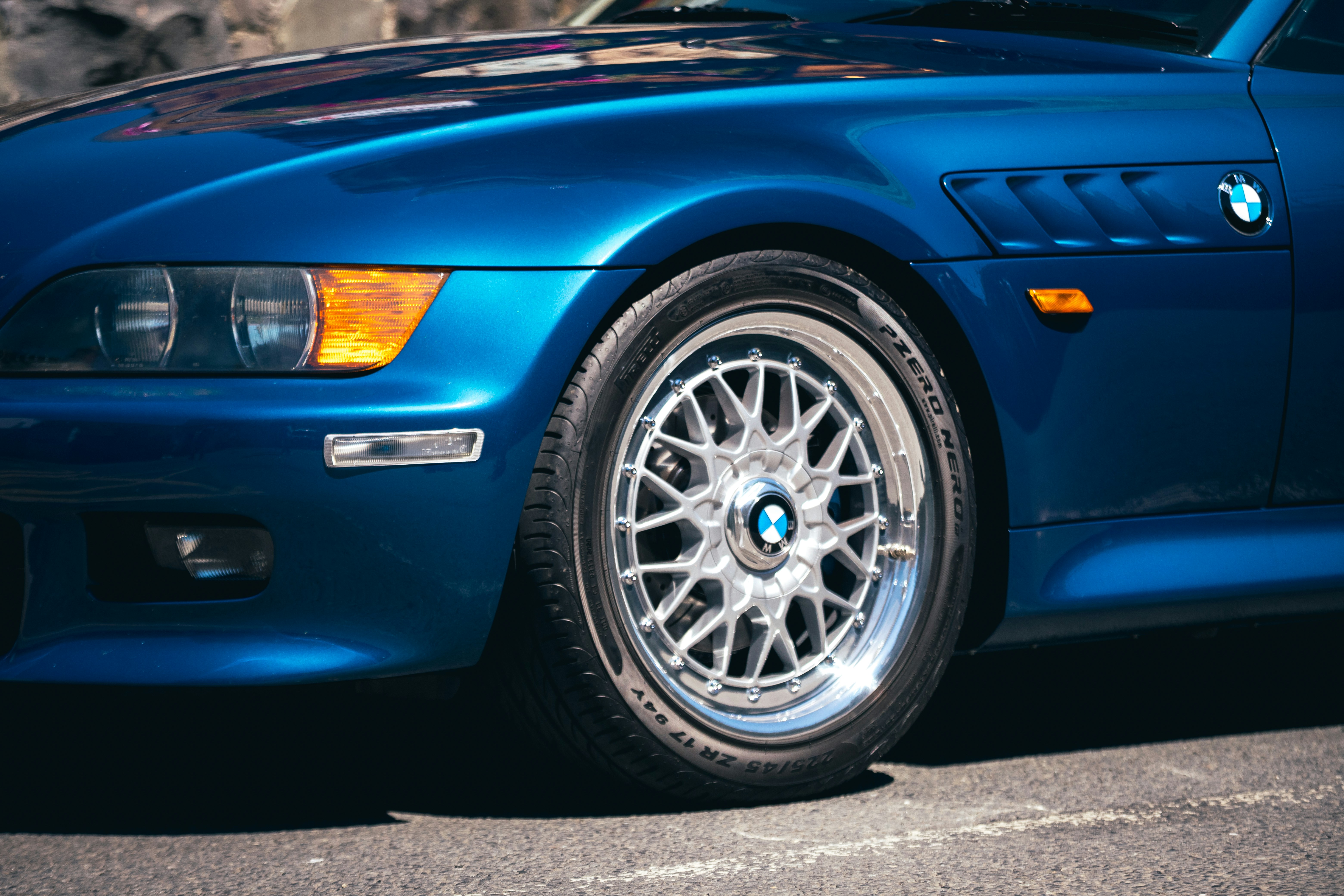 Blue Precision: A BMW Classic Resting on Shiny Alloy
