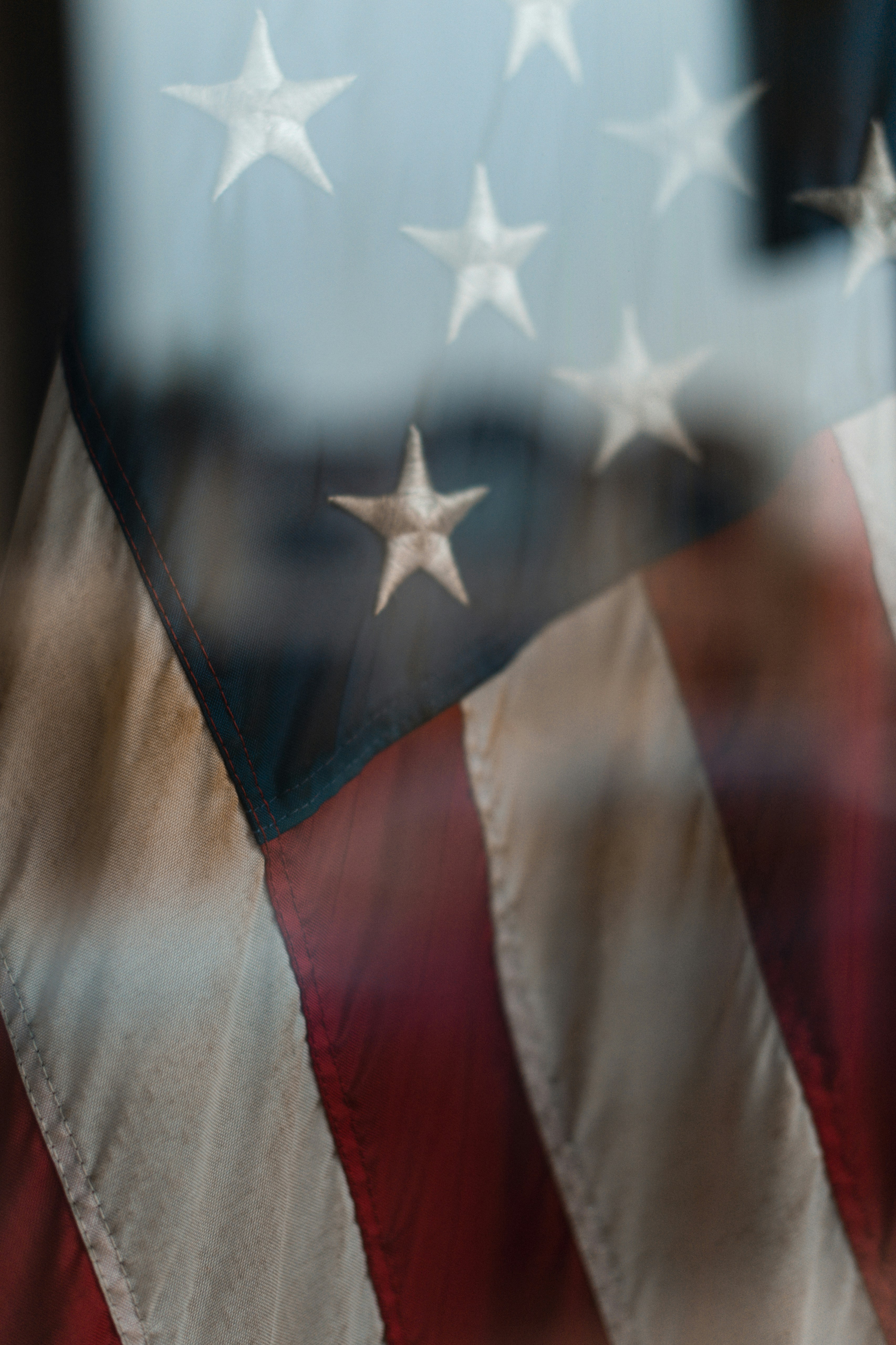 Flag Reflections and Stripes: An American Moment in Double Exposure