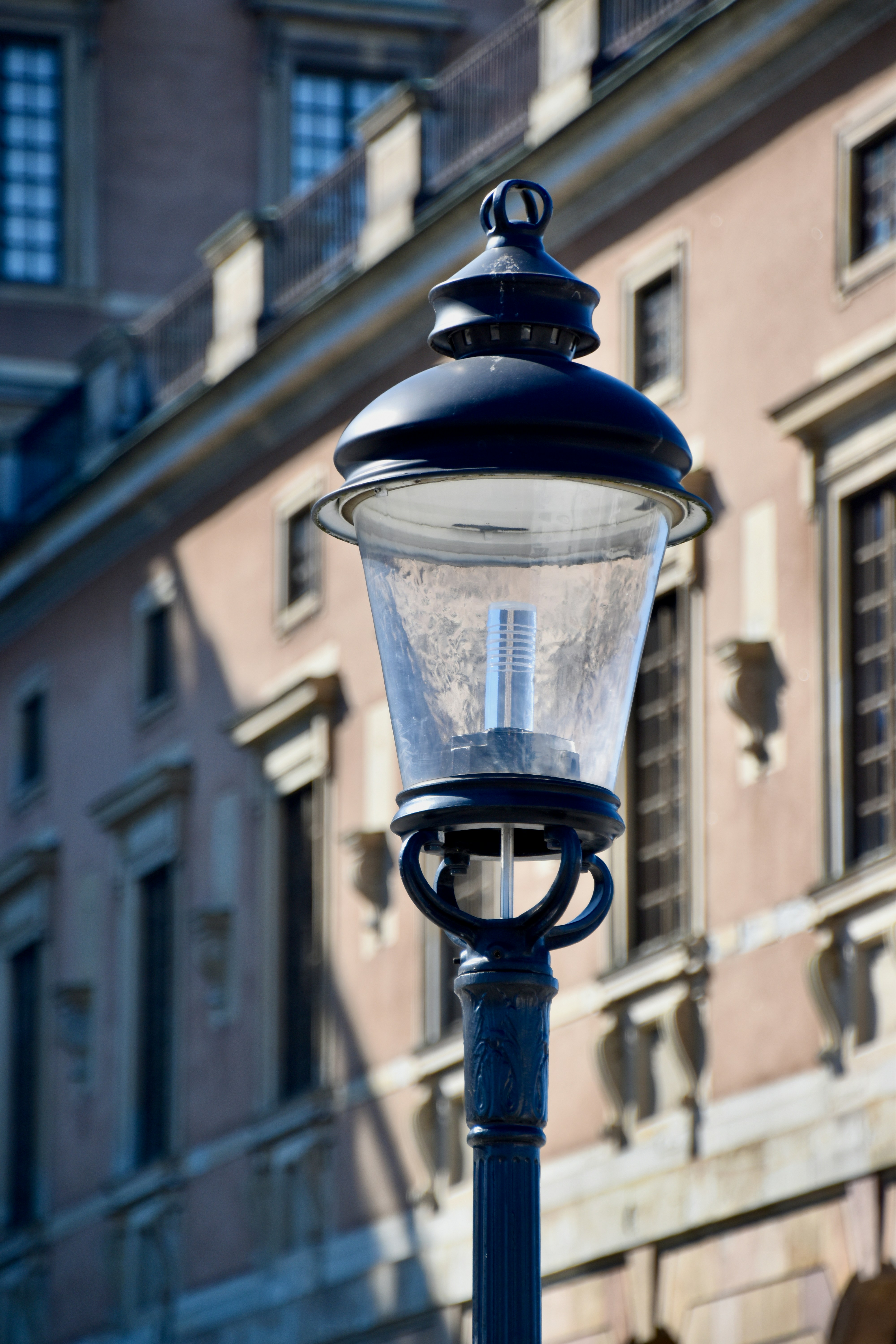 Old-World Street Lantern Under Soft Urban Light