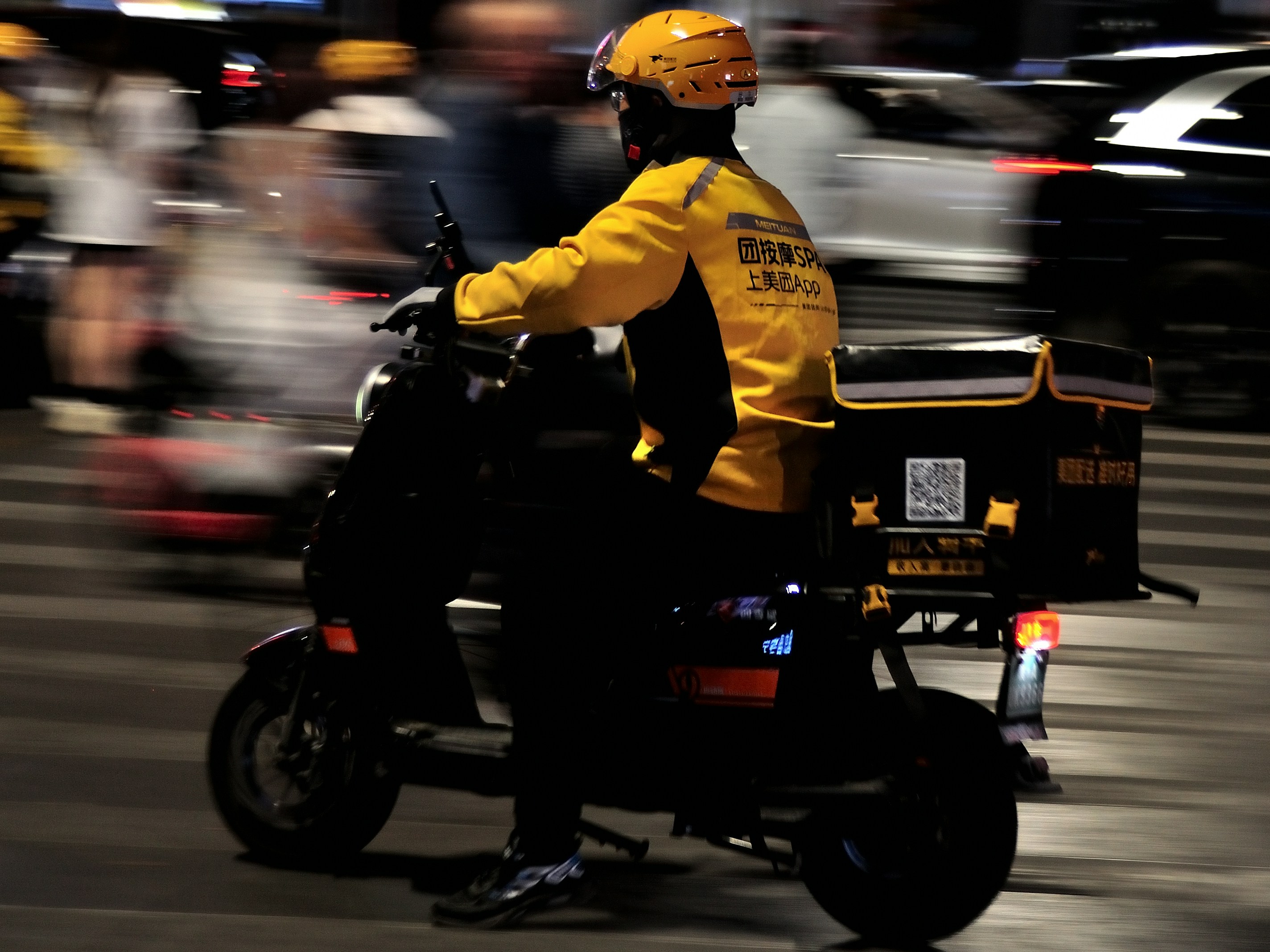 Urban Courier in Motion: Yellow Jacket on a Night Run