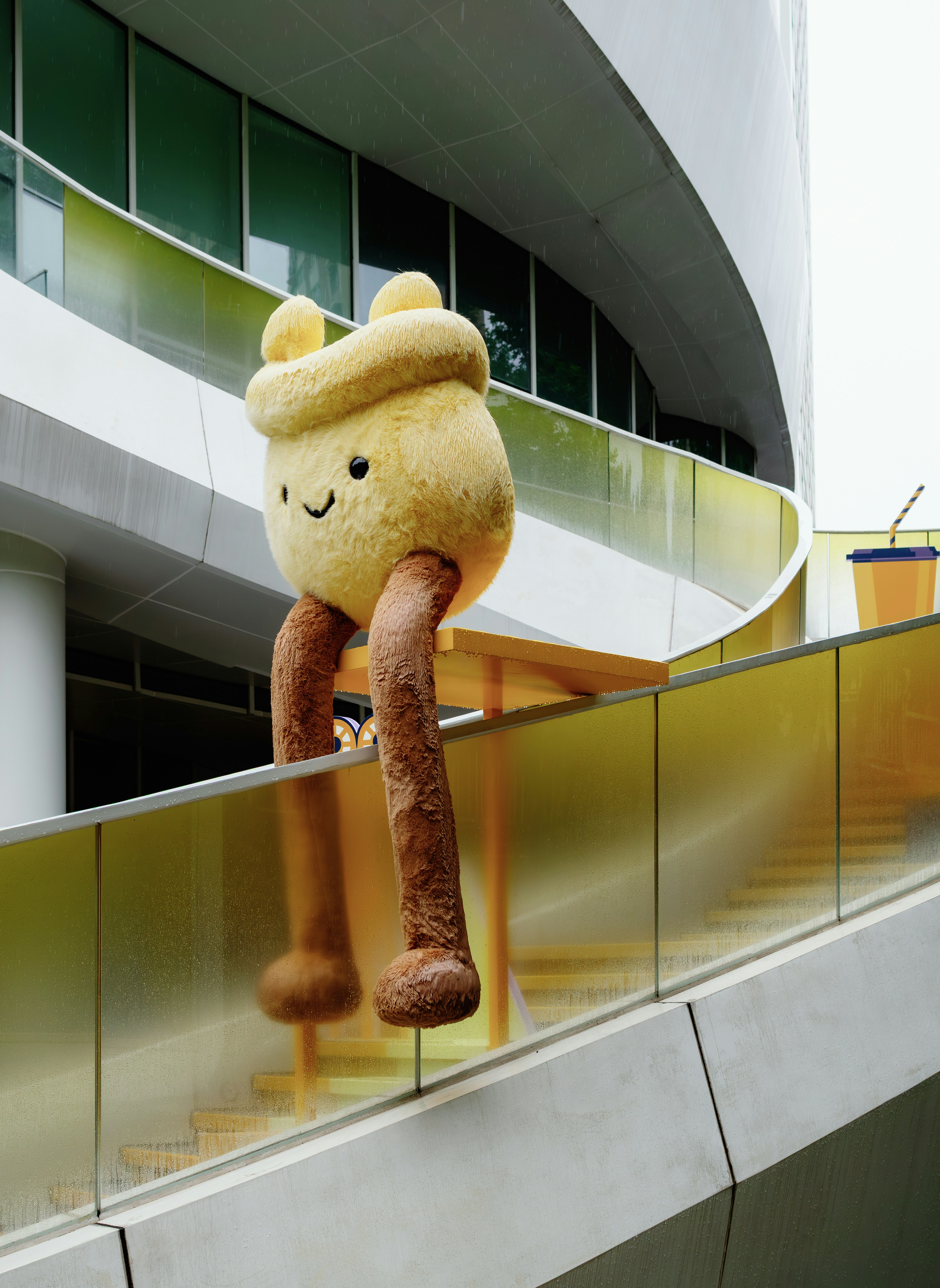 Cheerful Plush Overlook: A Cookie-Critter Perches Above the Glass Rim
