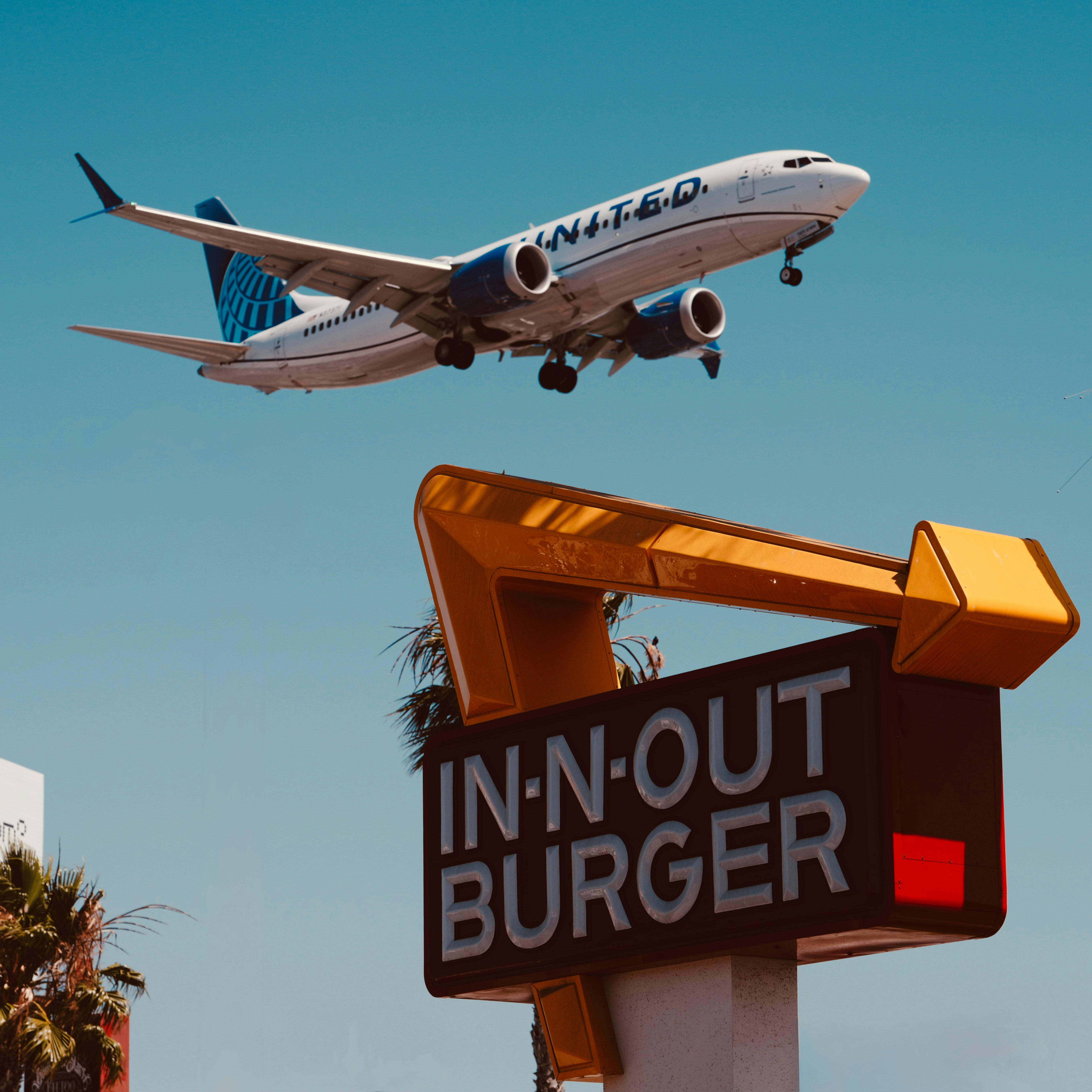 Skyline Lift: An Airliner Clears the In-N-Out Sign