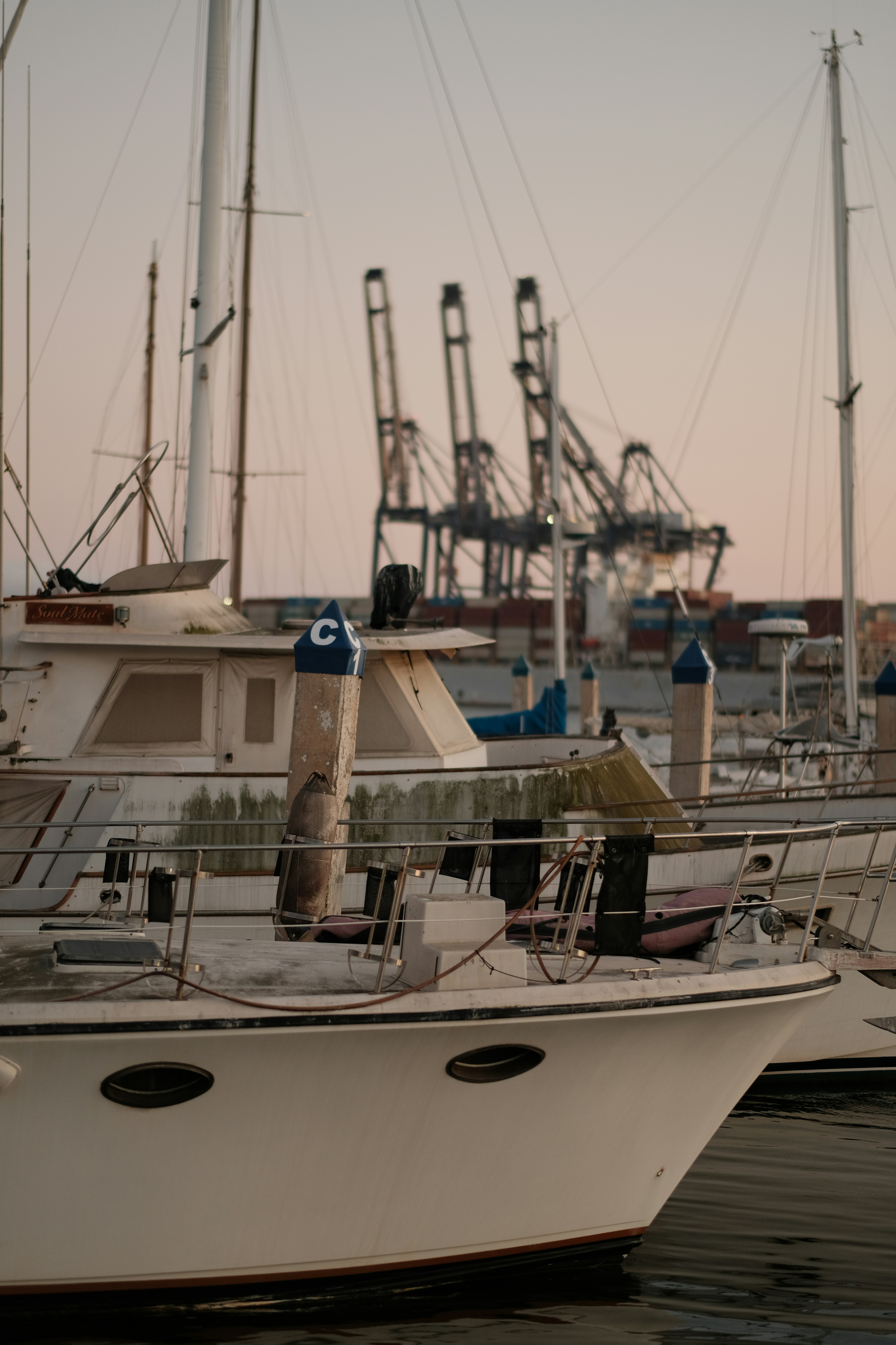 Docked Quiet: Boats Rest Beneath a Sunset Marina