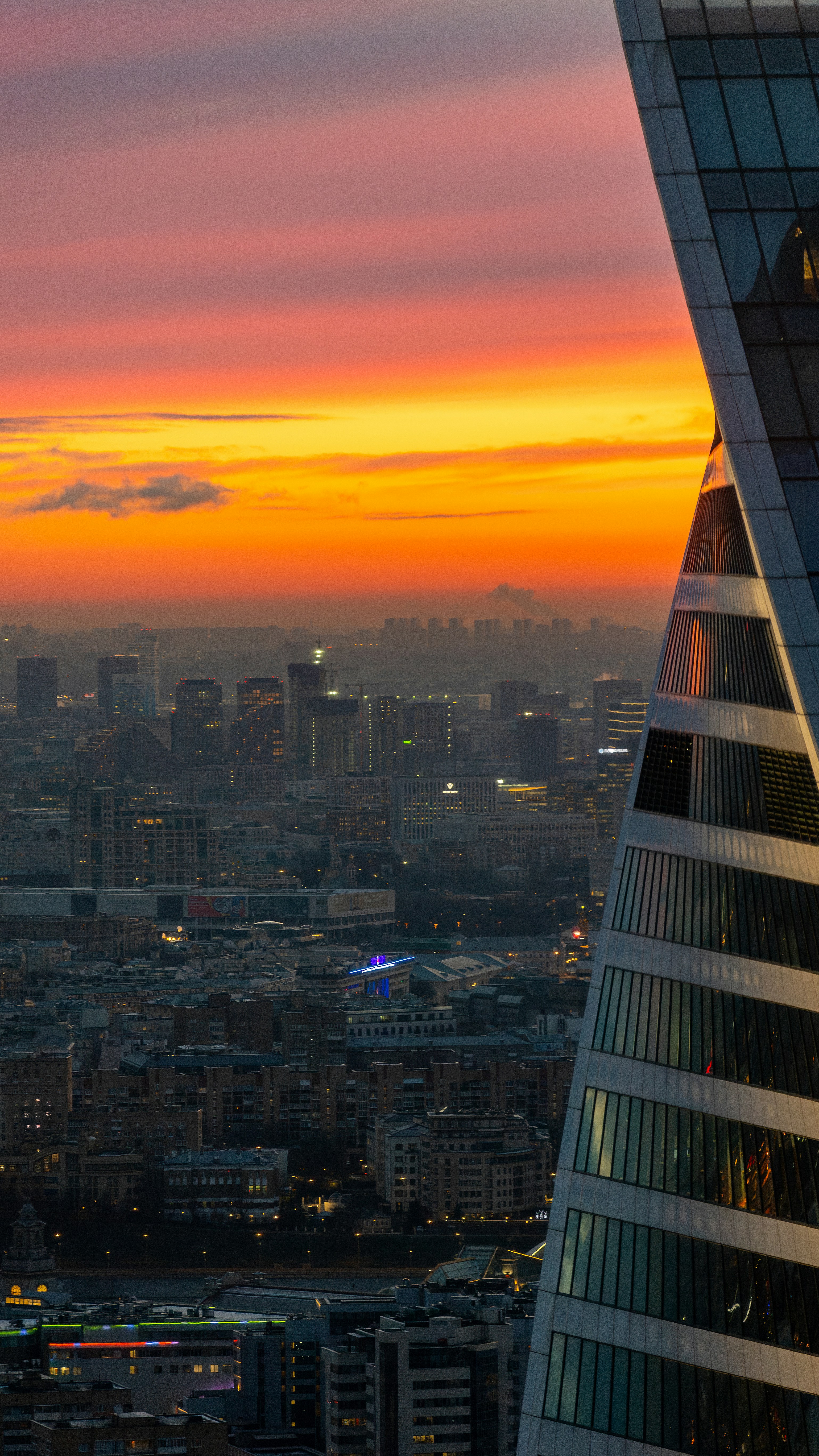 Sunset Over the Urban Spine: A Tower Leaning into the Sky