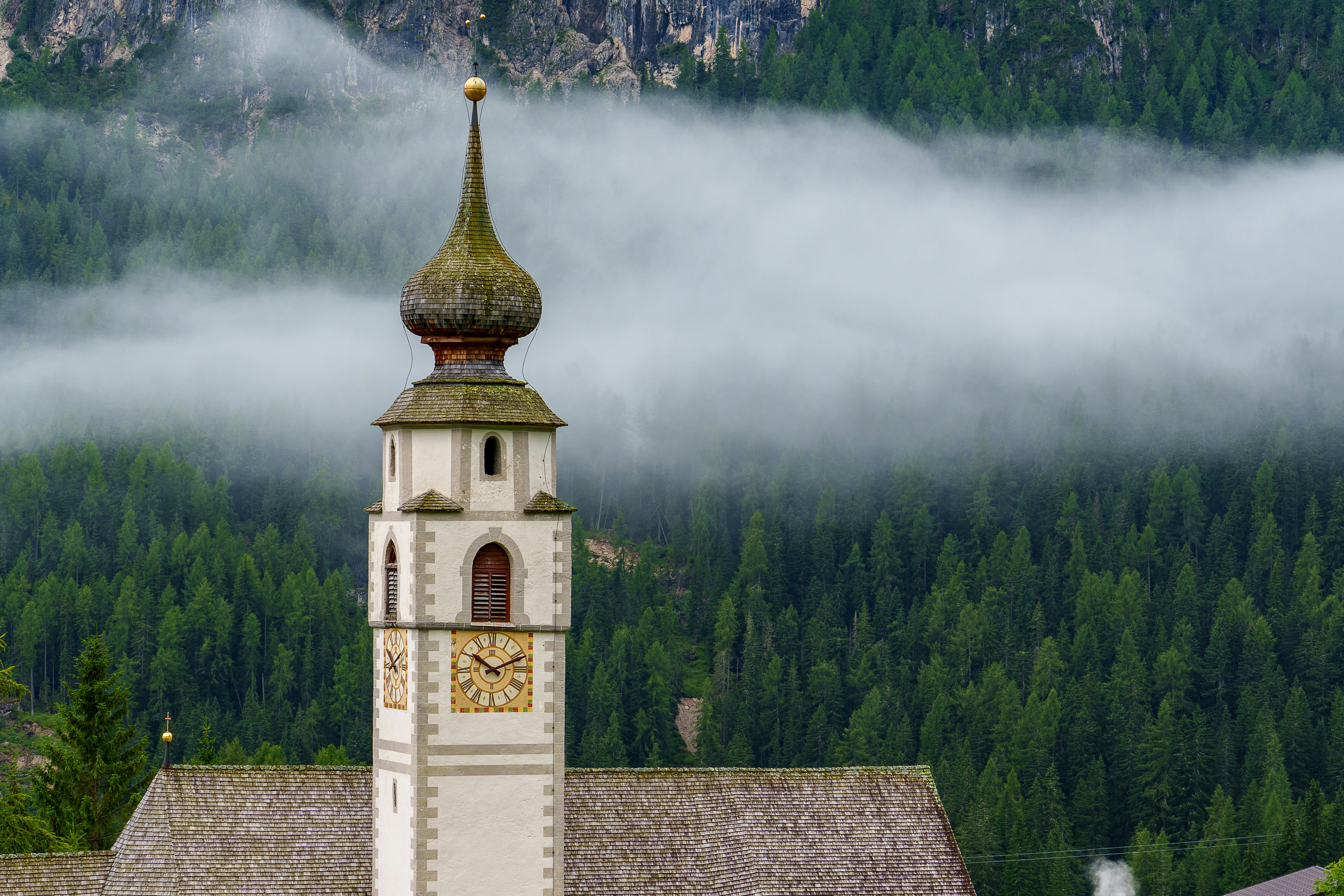 Mist-Rimmed Bell Tower in Alpine Quiet