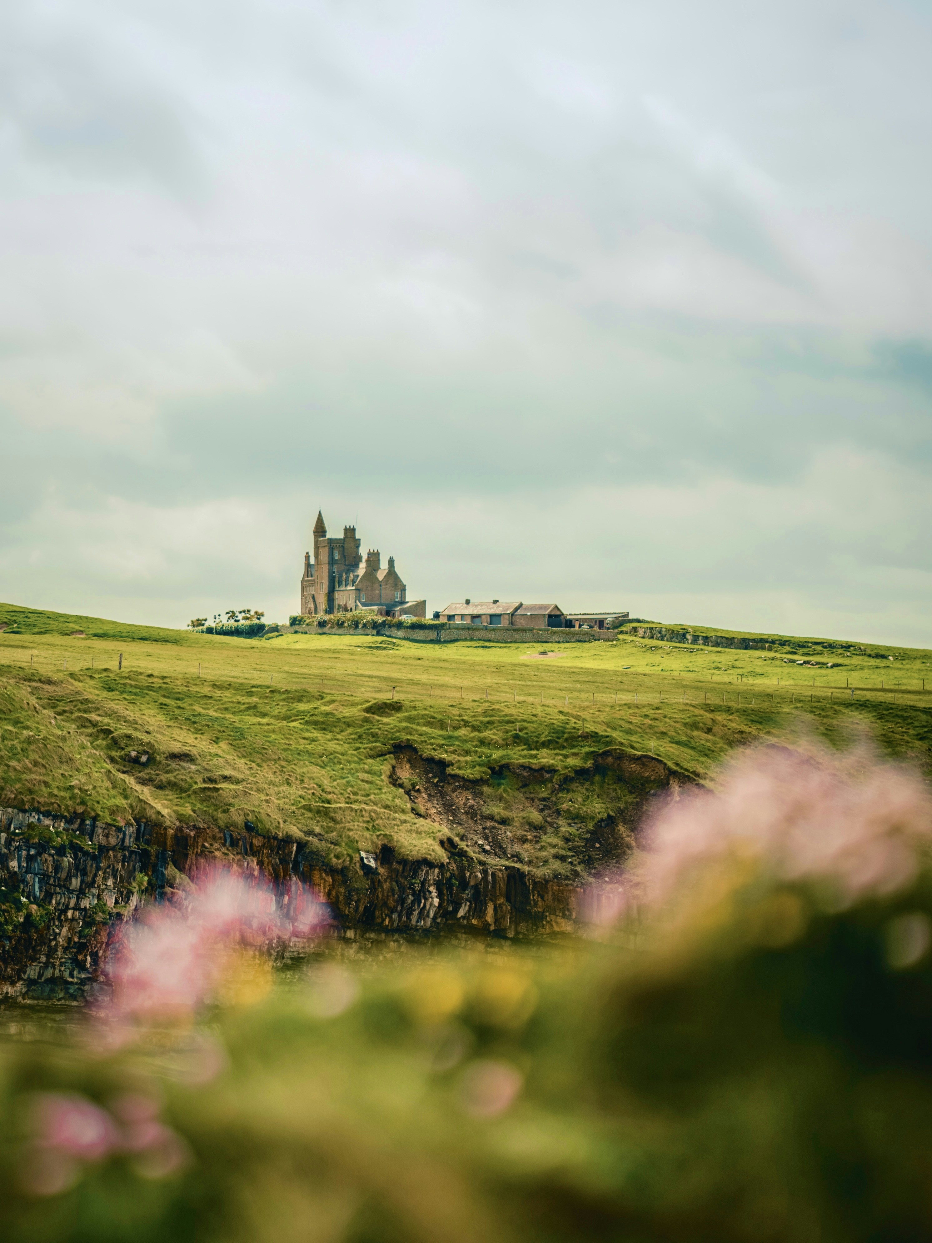 Castle on the Hill: A Quiet Coastal Farmstead in Soft Light