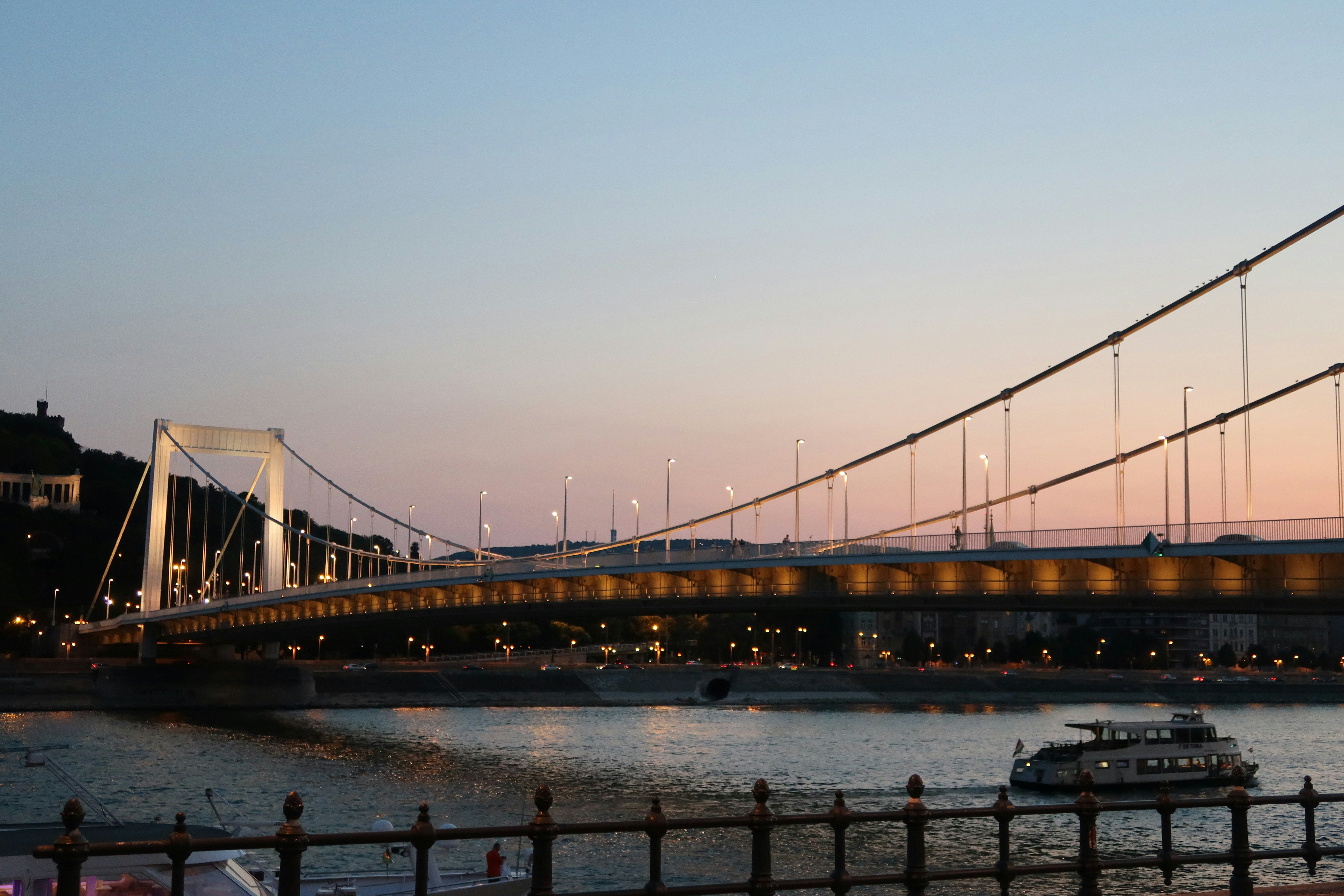 Twilight Span: A Riverside Bridge at Dusk