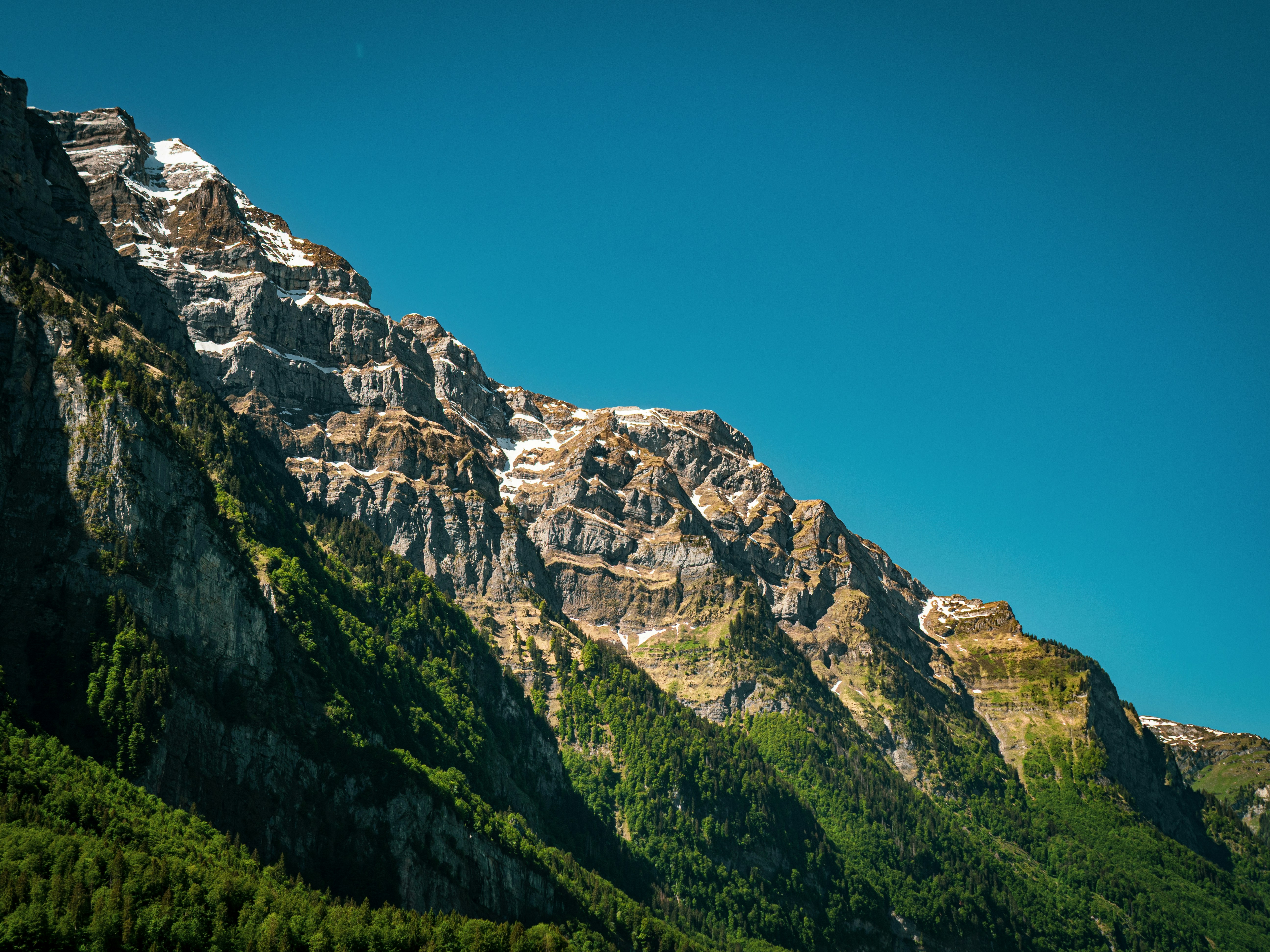 Sunlit Ridges Above a Green Valley