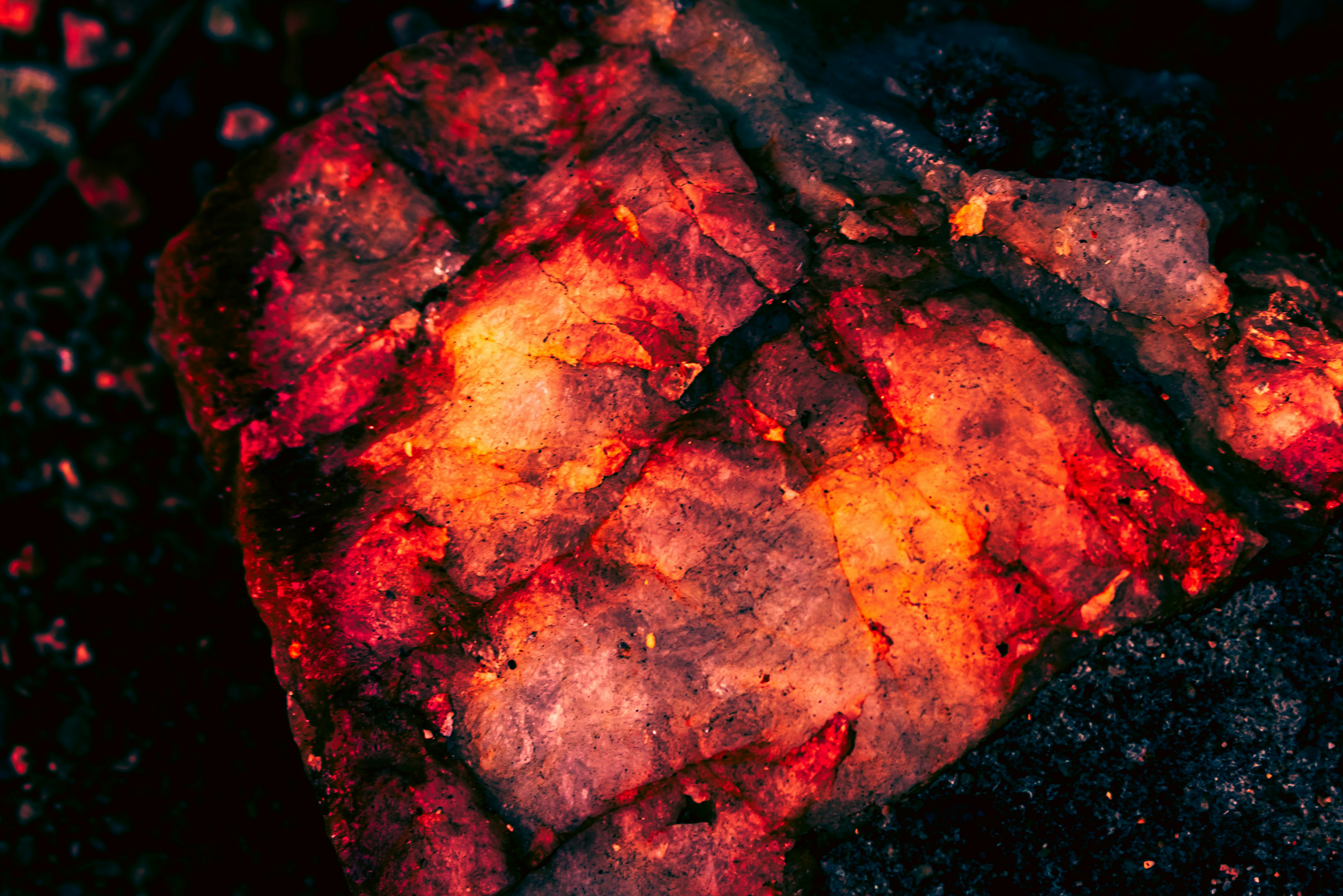 Crimson Glow: A Vein of Molten Ember in Ashes