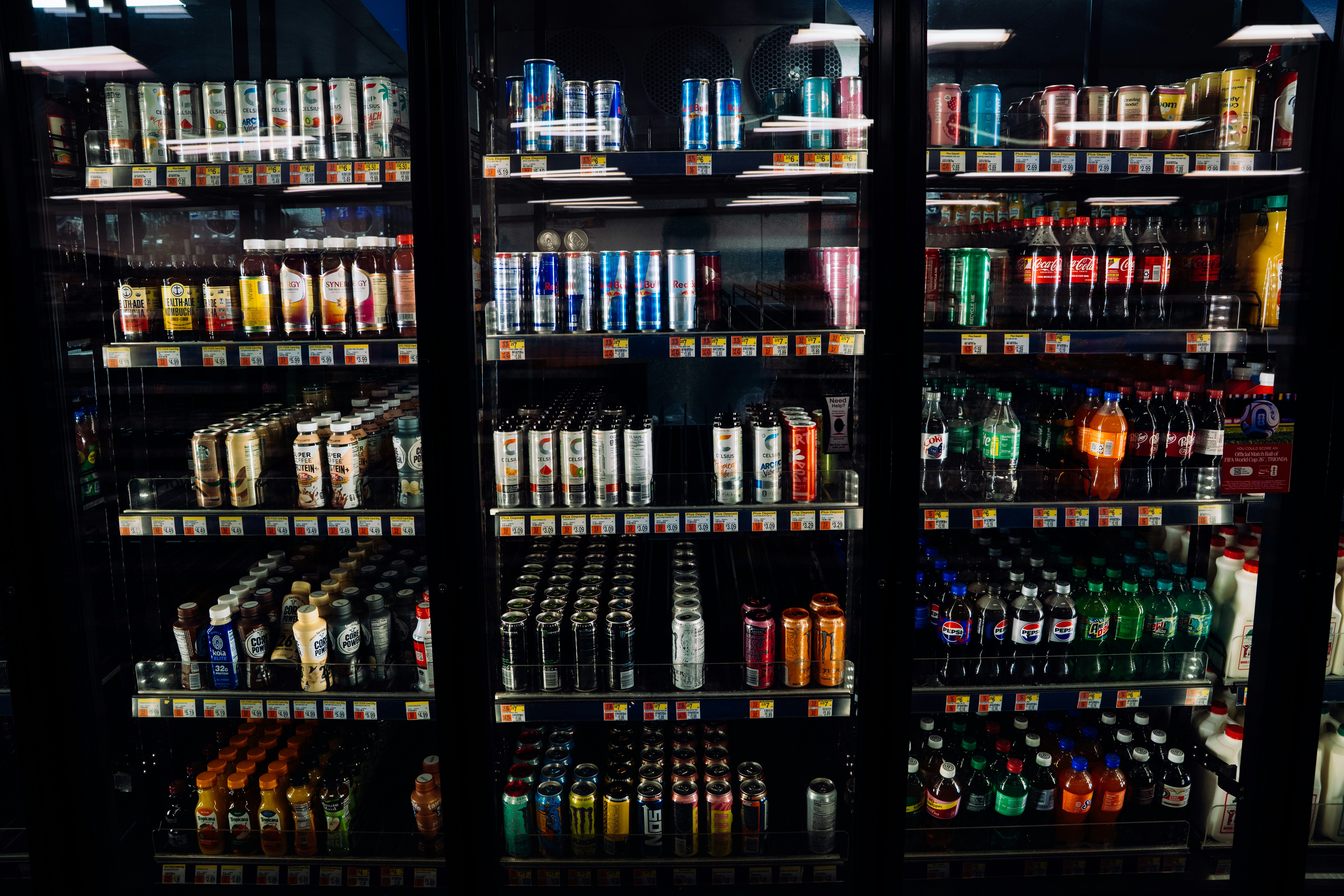 Midnight Aisle: Neon Reflections in a Managerial Fridge