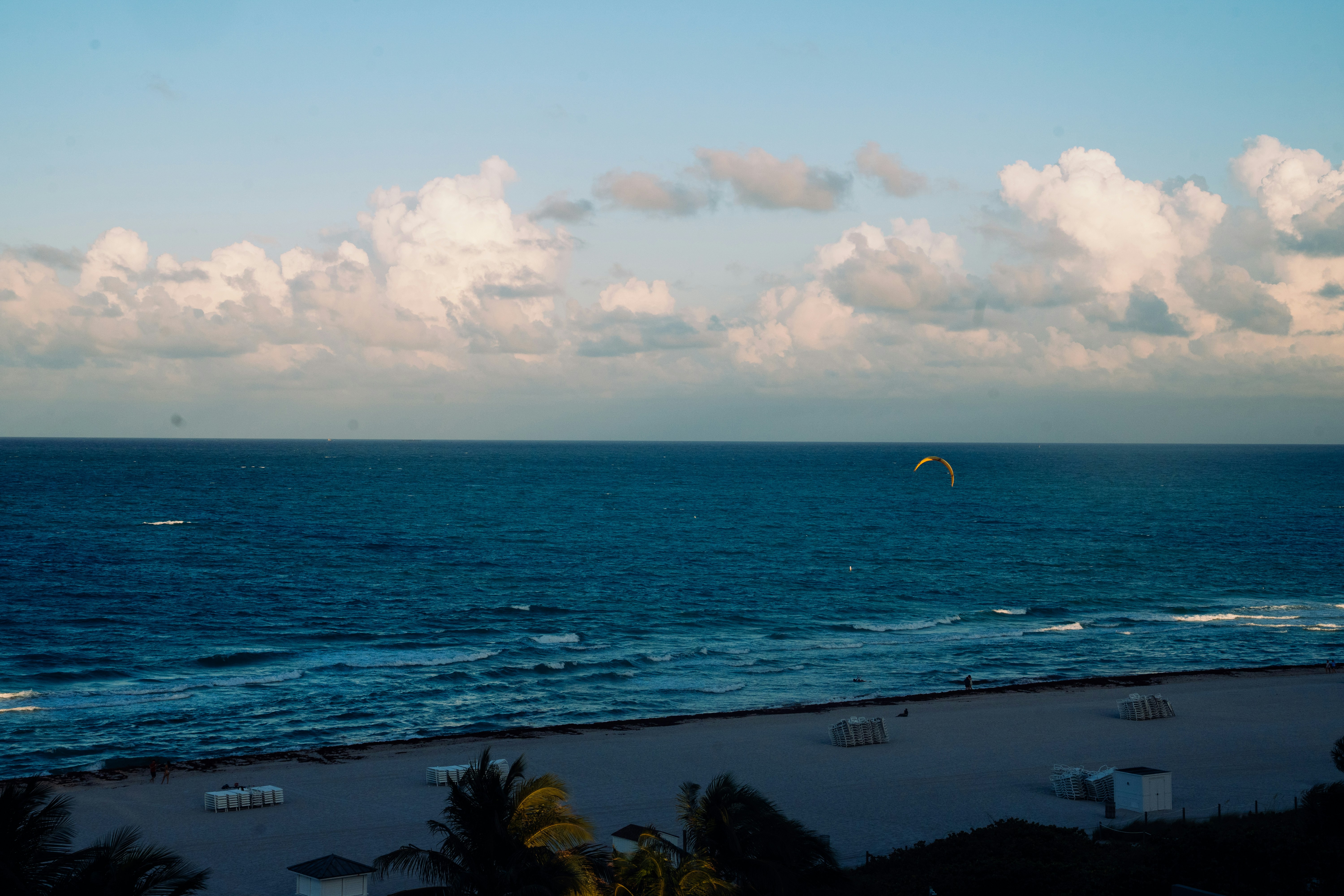 Coastal Horizon Under a Sky of Plush Clouds