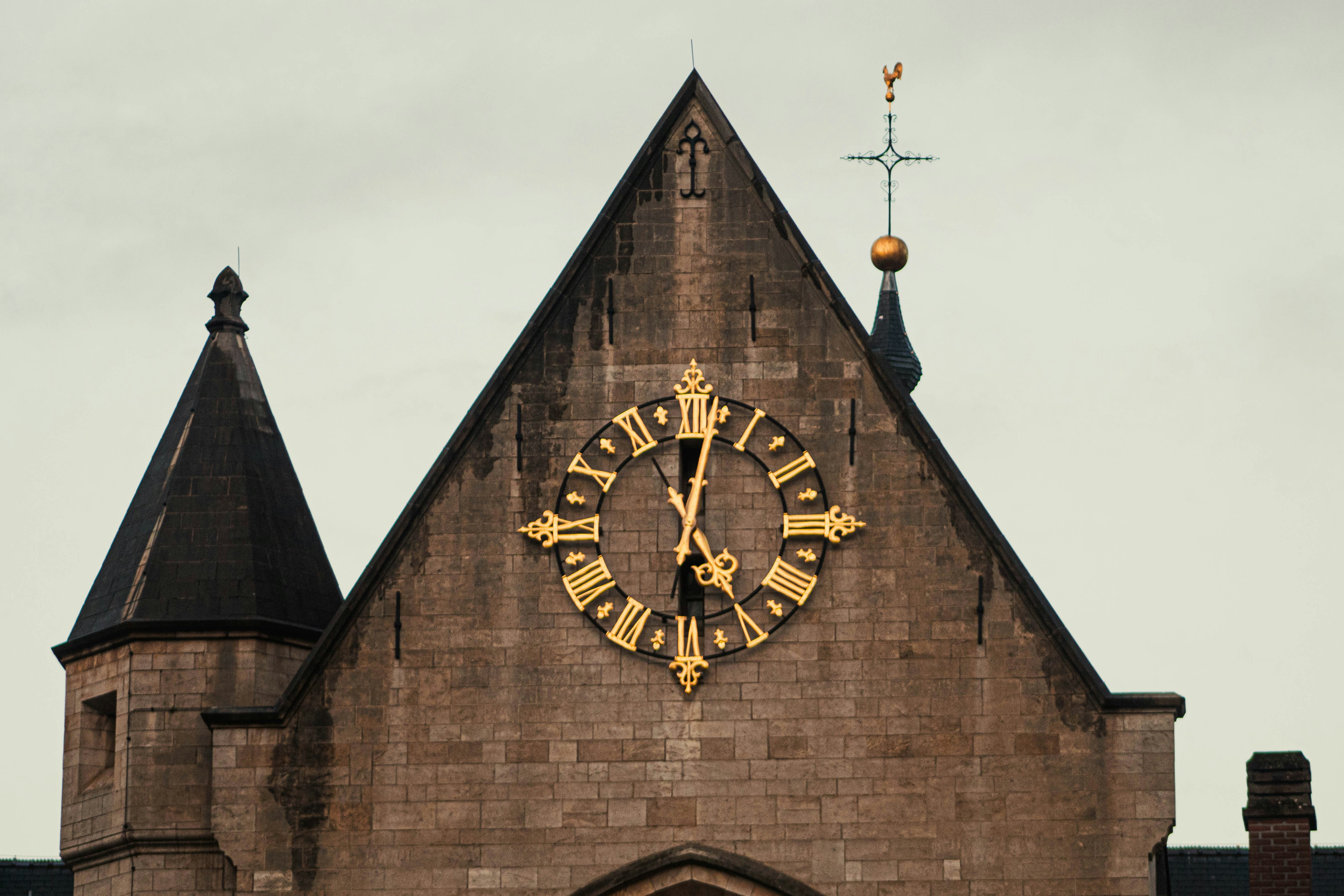 Golden Clock in a Gabled Facade