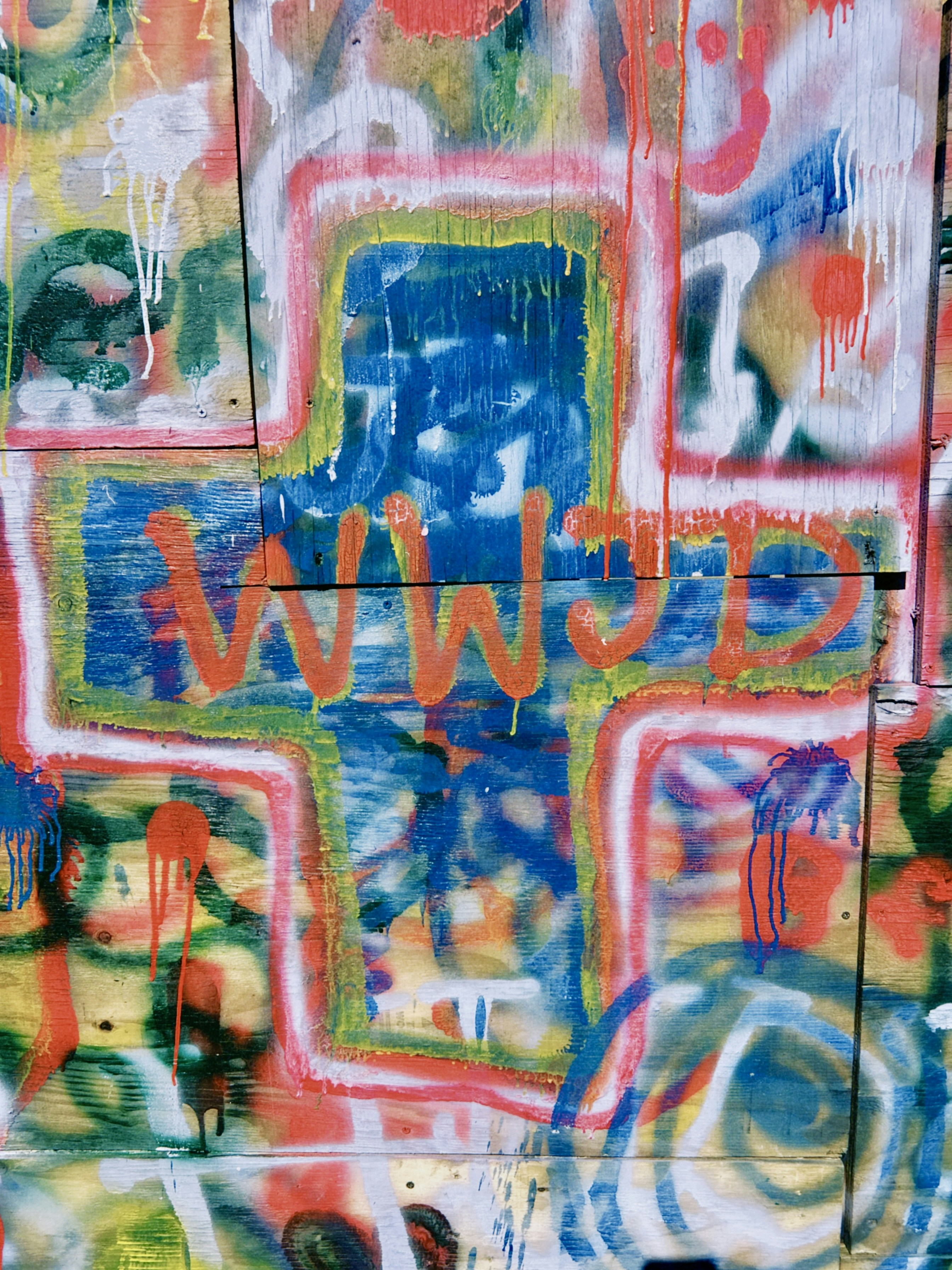 Vivid Crossroads: Neon Graffiti Window into Urban Color