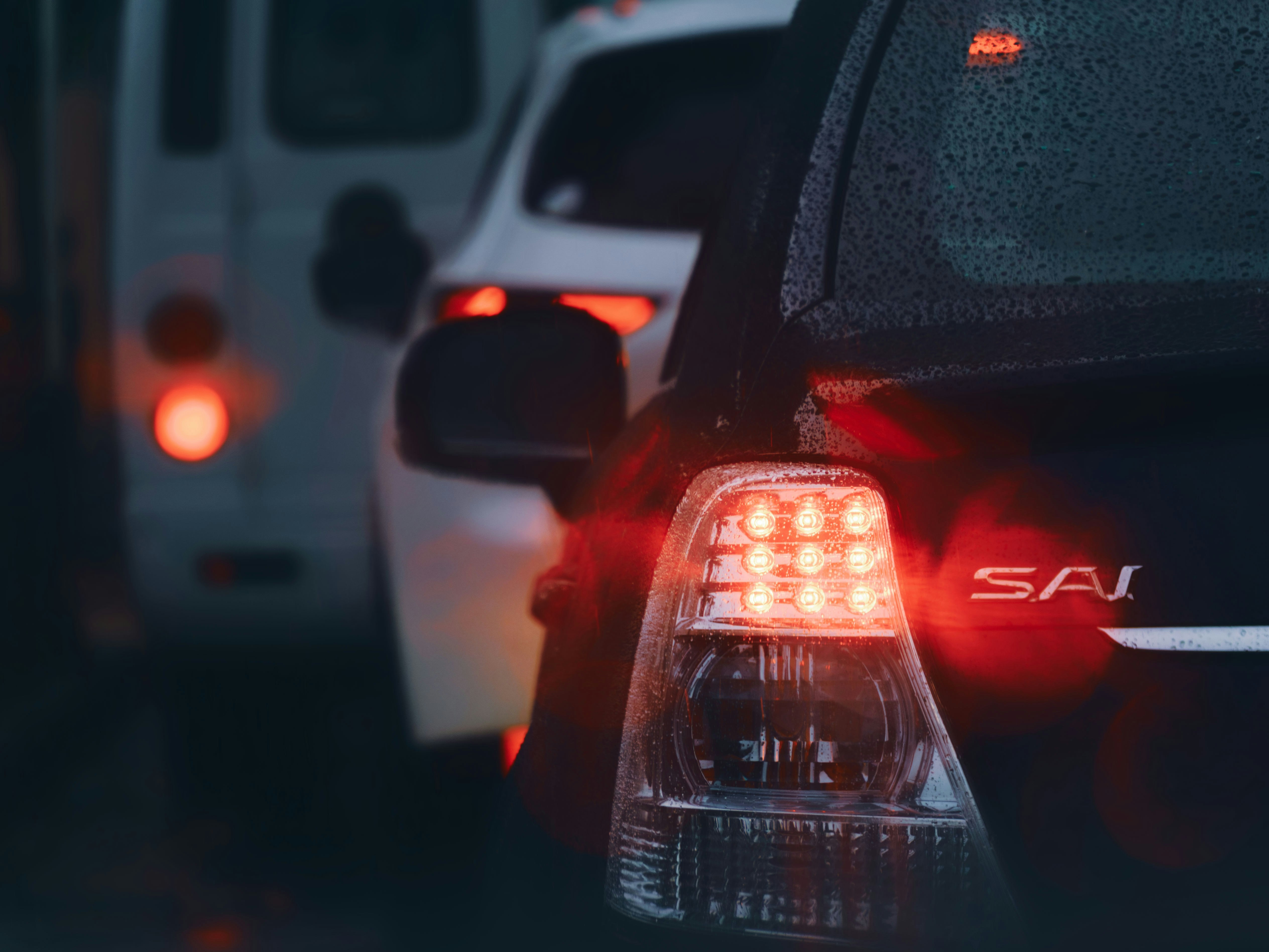 Red Brake Light Echo in Evening Traffic