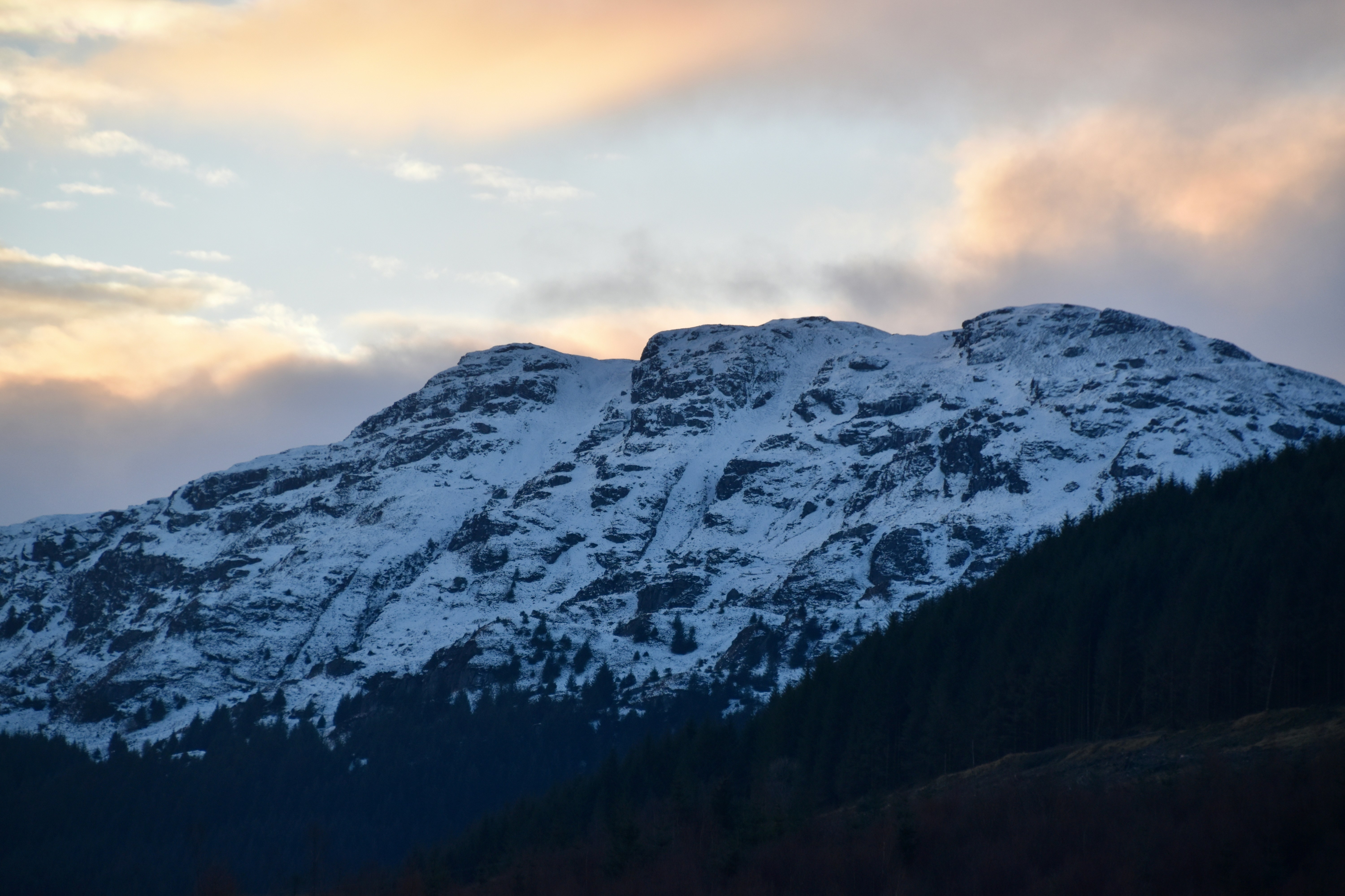 Snow-Capped Summit Beneath Dusk Sky