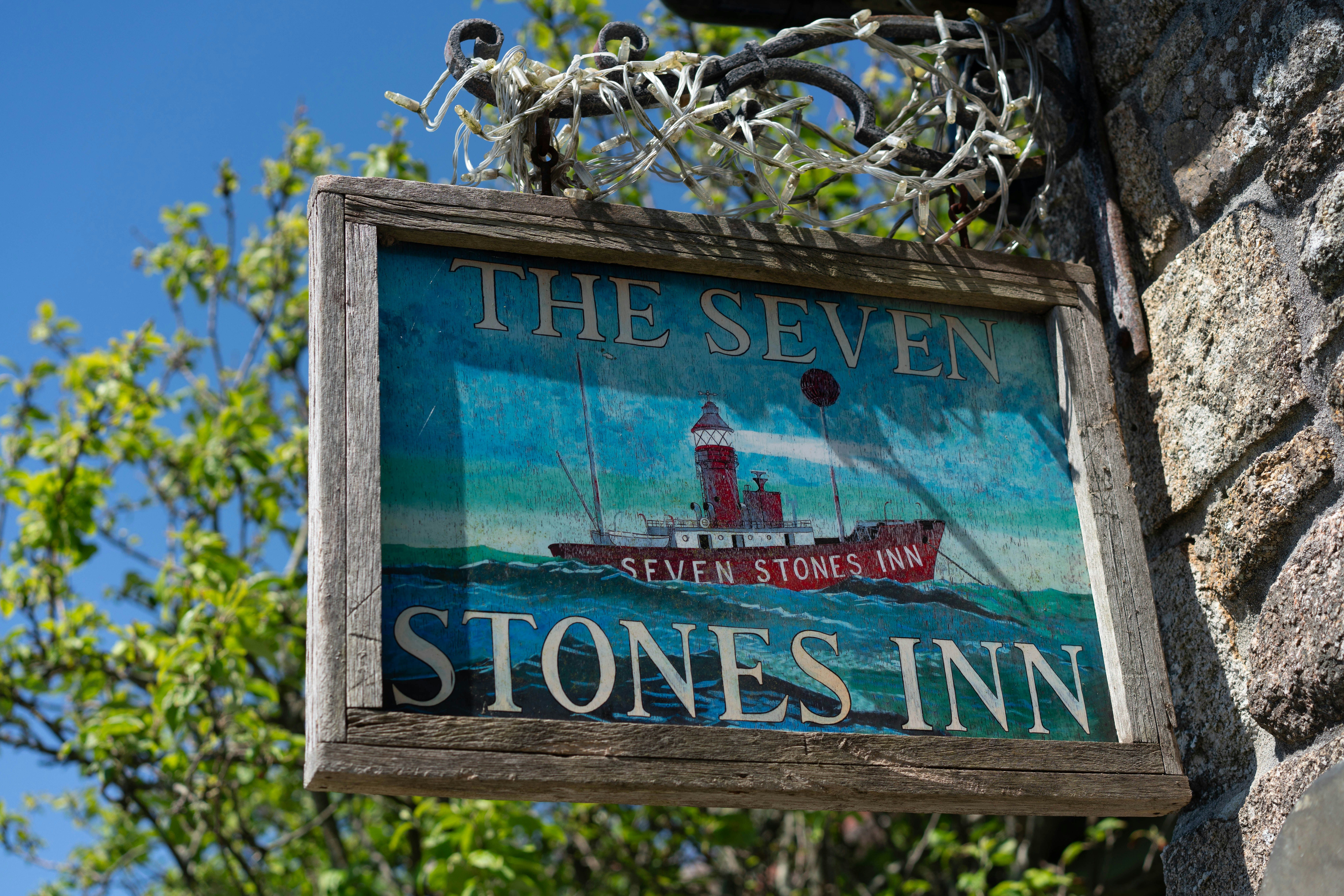The Seven Stones Sign: A Painted Harbor Portrait