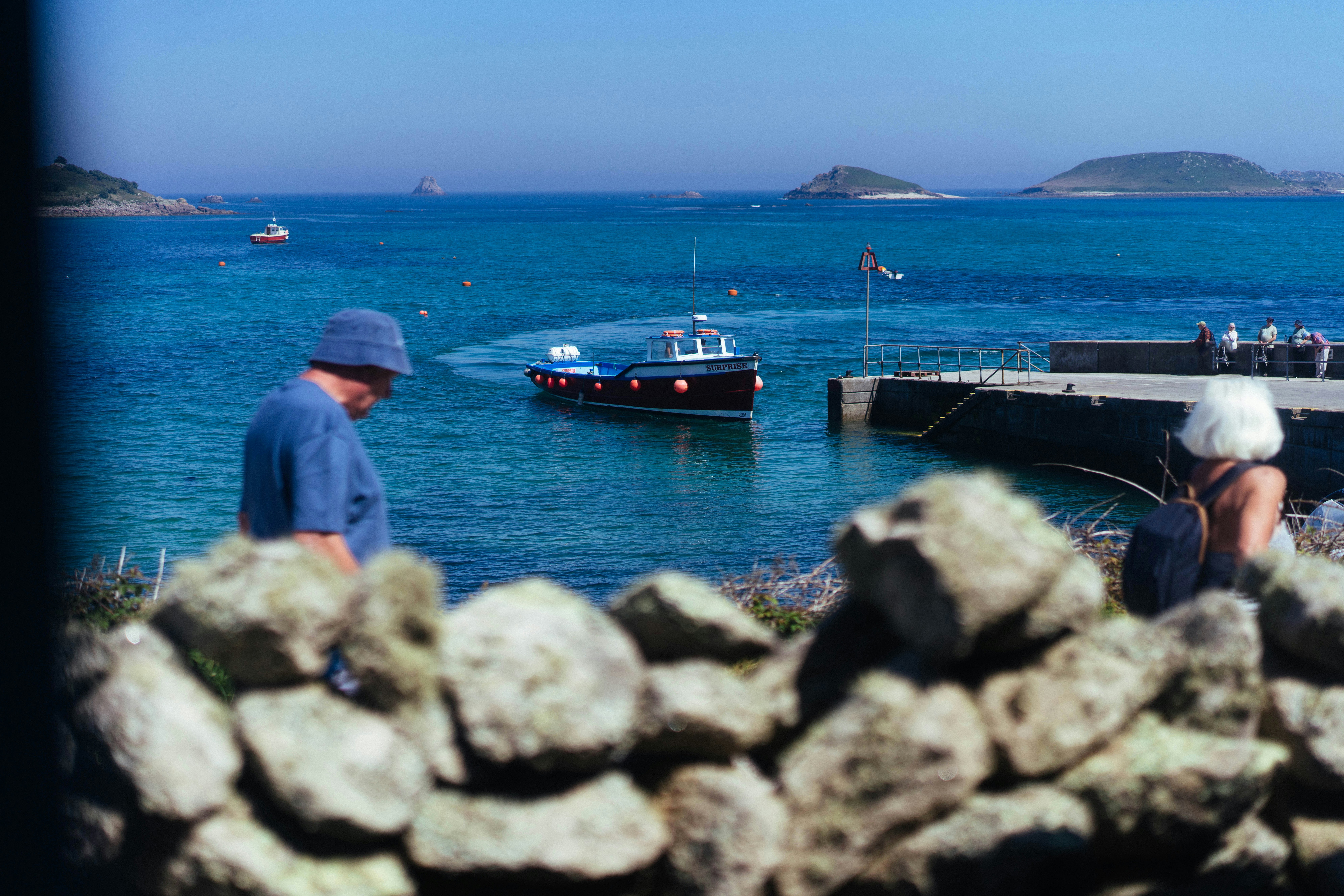 Blue Harbor Wake: A Quiet Moment by the Sea