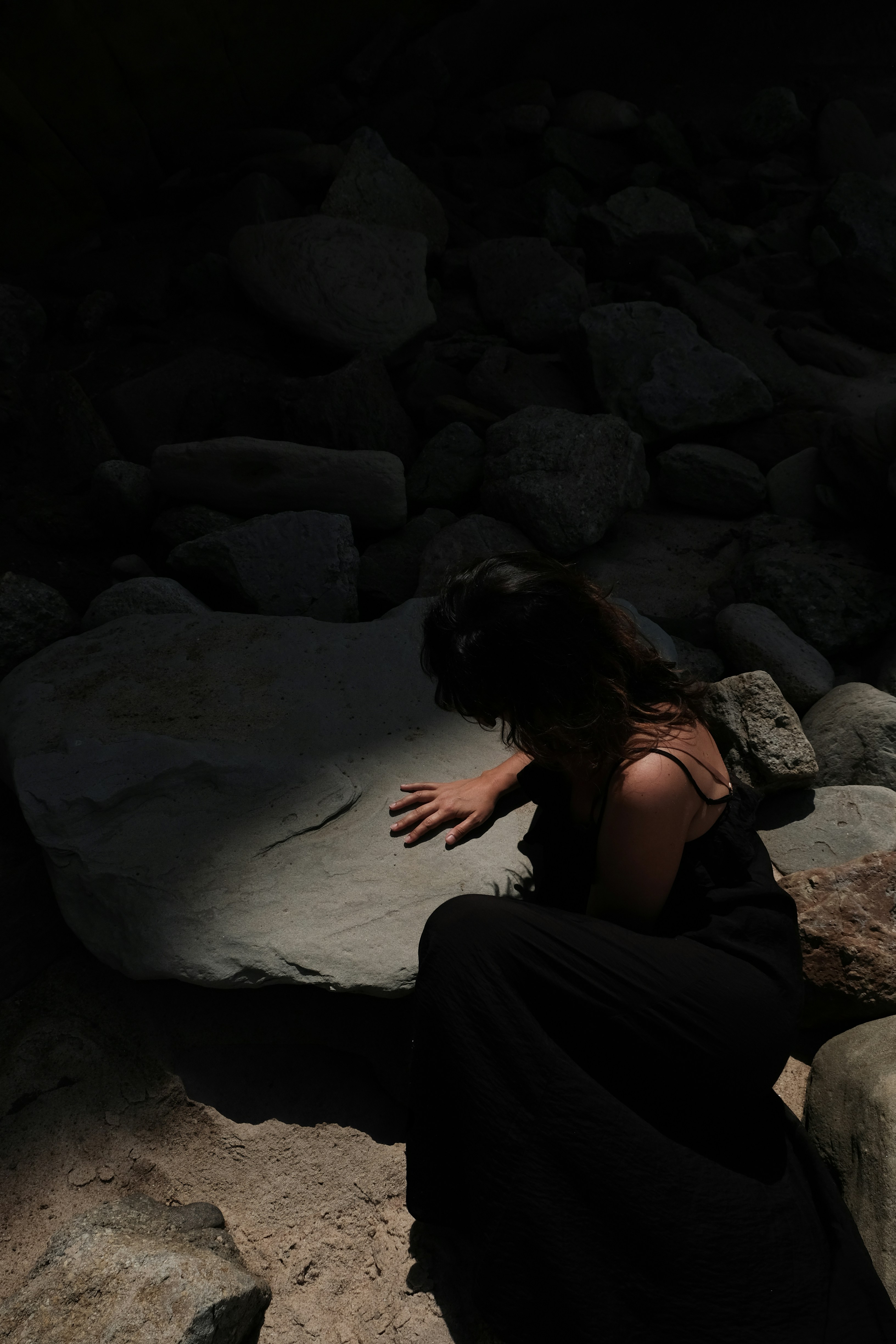 Dark Cove: A Quiet Embrace Beneath the Rocks
