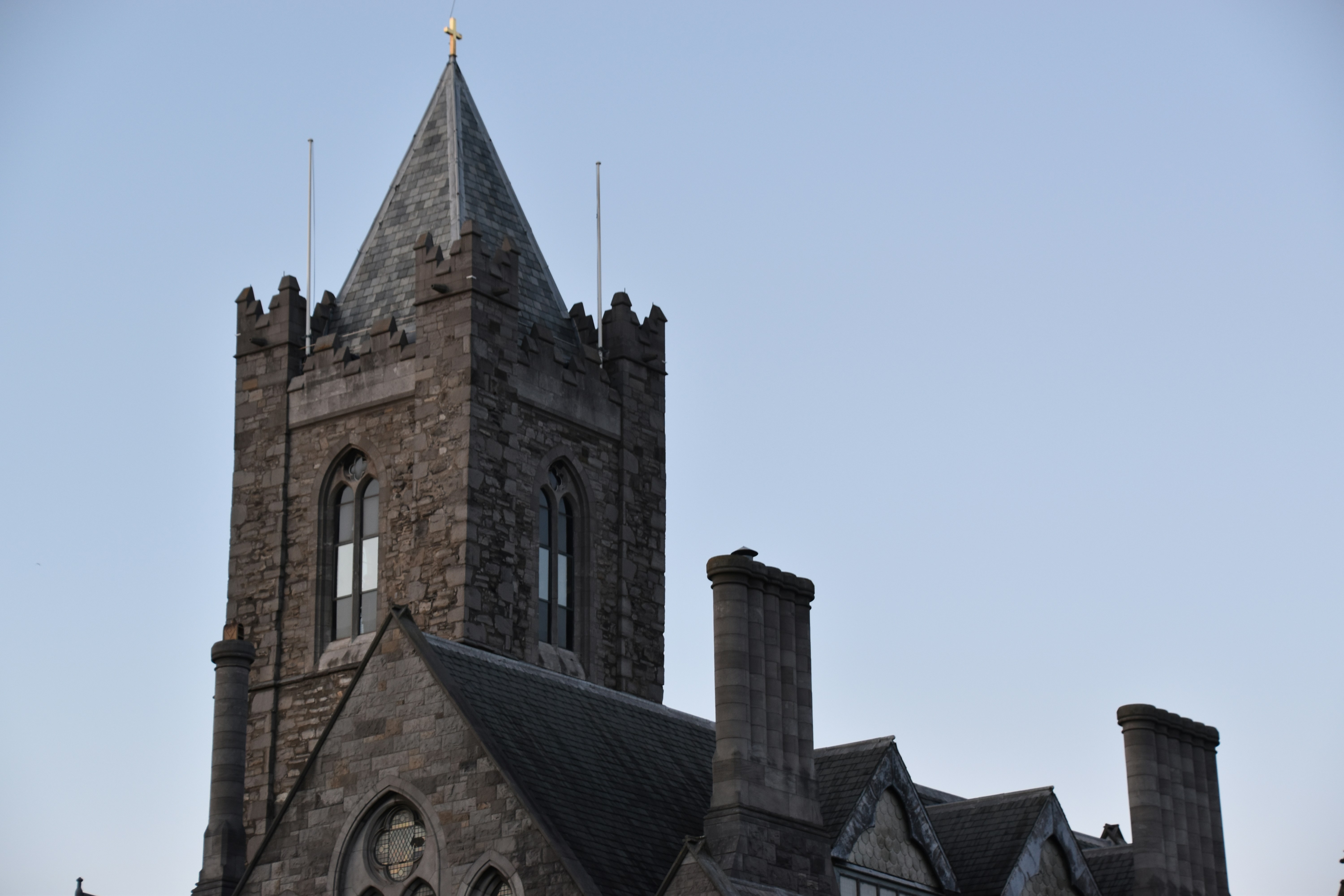 Gothic Tower Stems Against a Clear Sky
