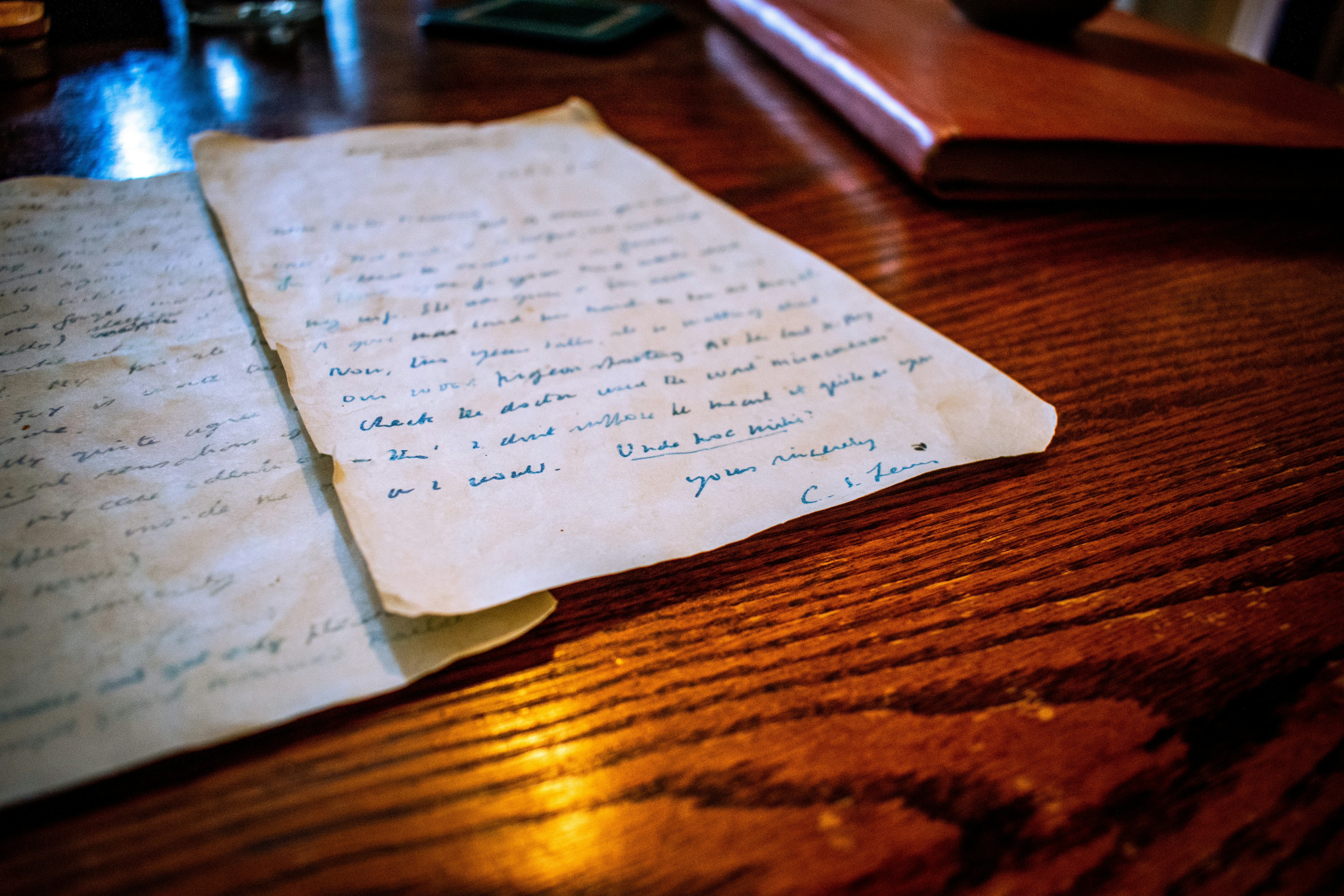A Dimly Lit Table Whispering Letters