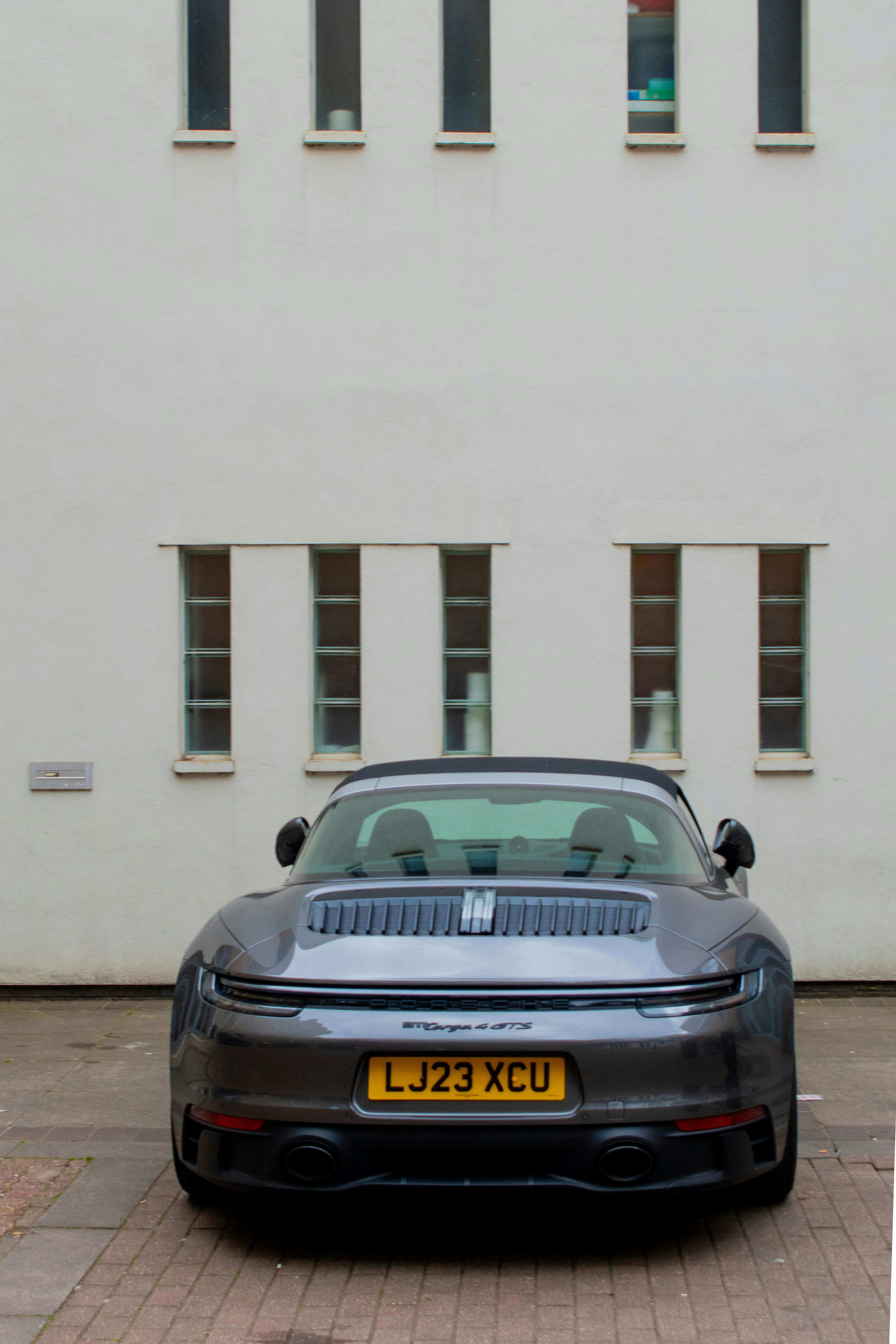 Front-and-Centred: A Modern Convertible in a Quiet Courtyard