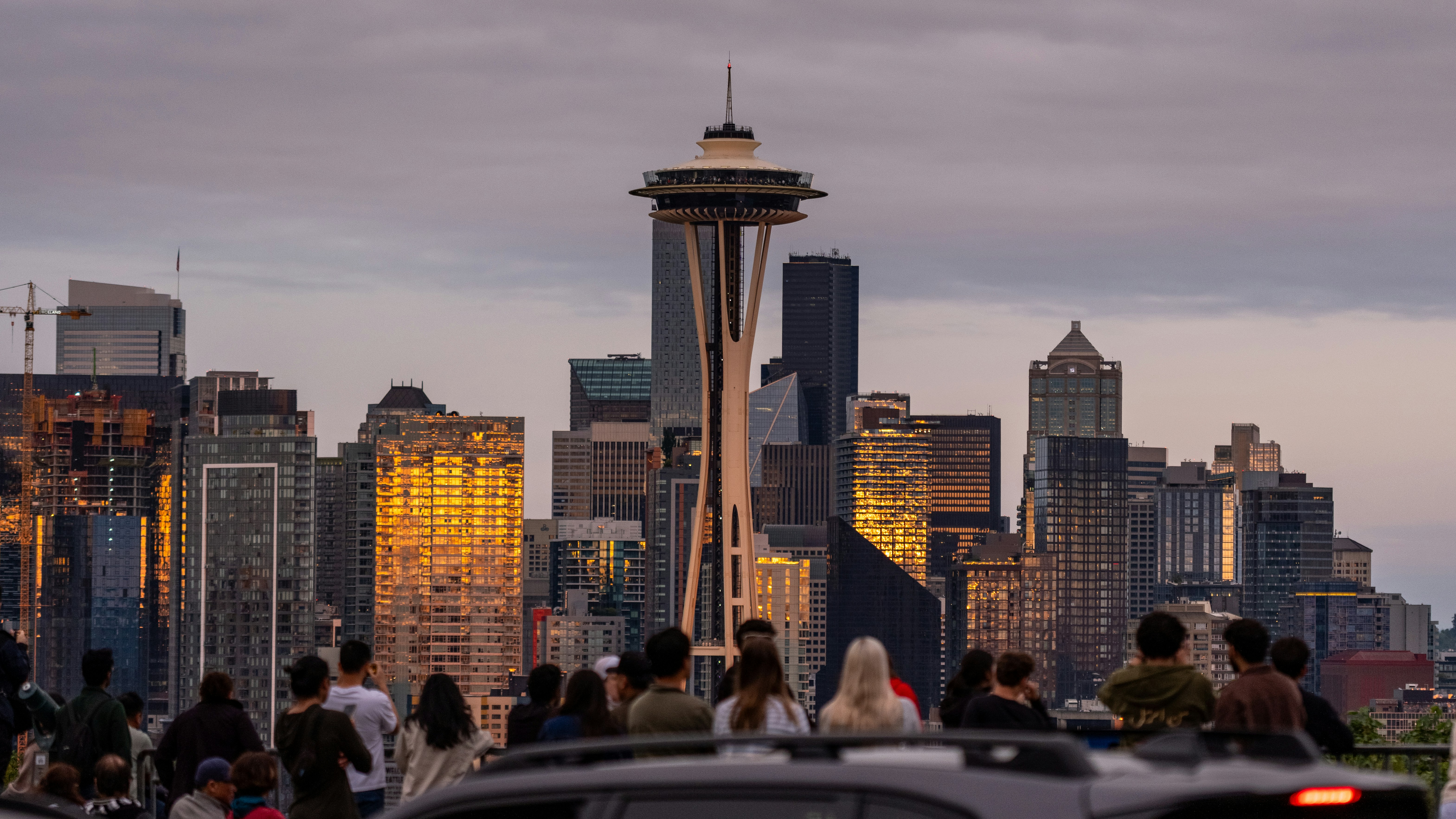 Seattle Skyline Gaze: A Crowd in the Foreground Beneath the Space Needle