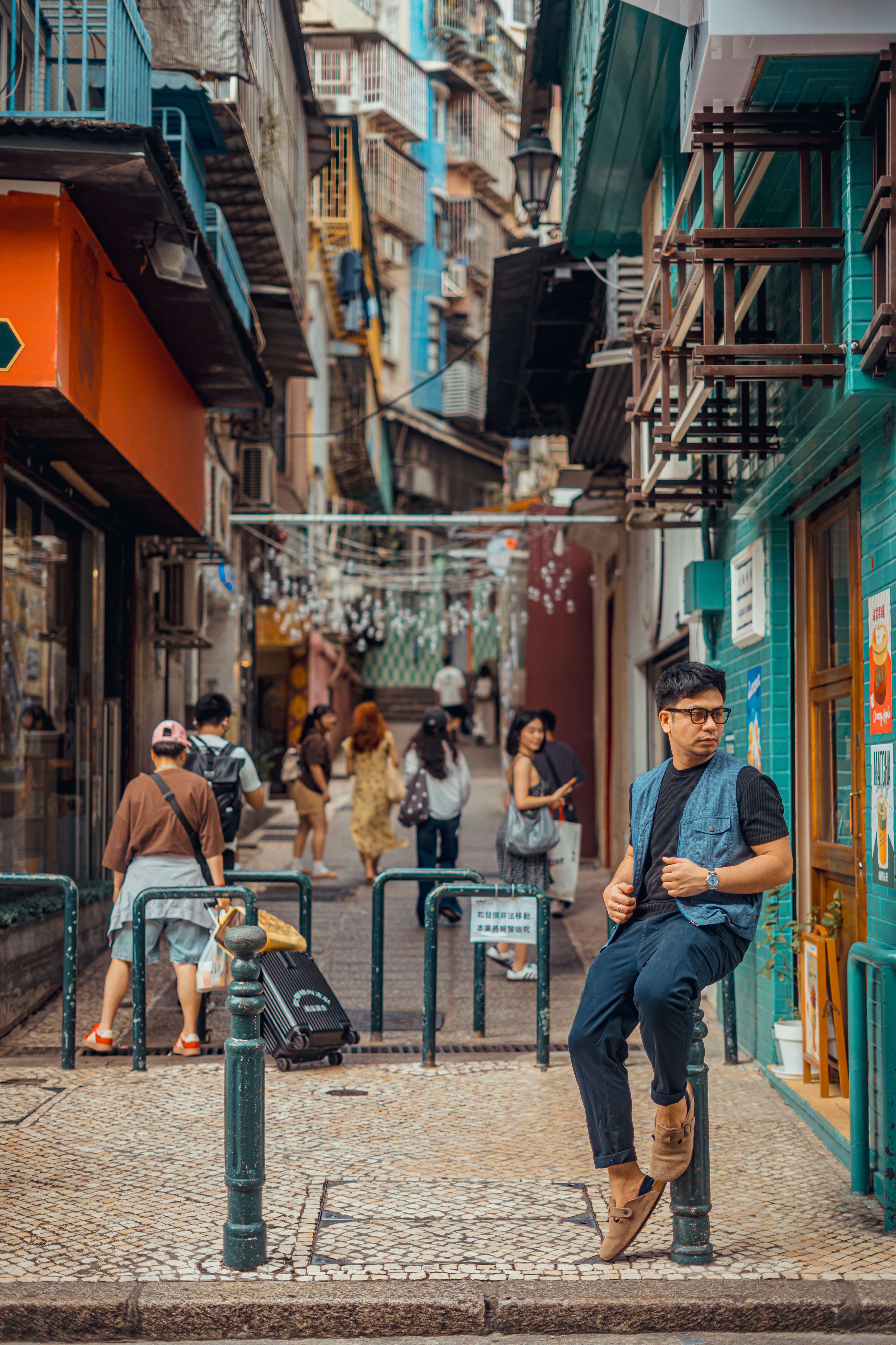 Urban Escape: A Casual Pause in a Colorful Alley