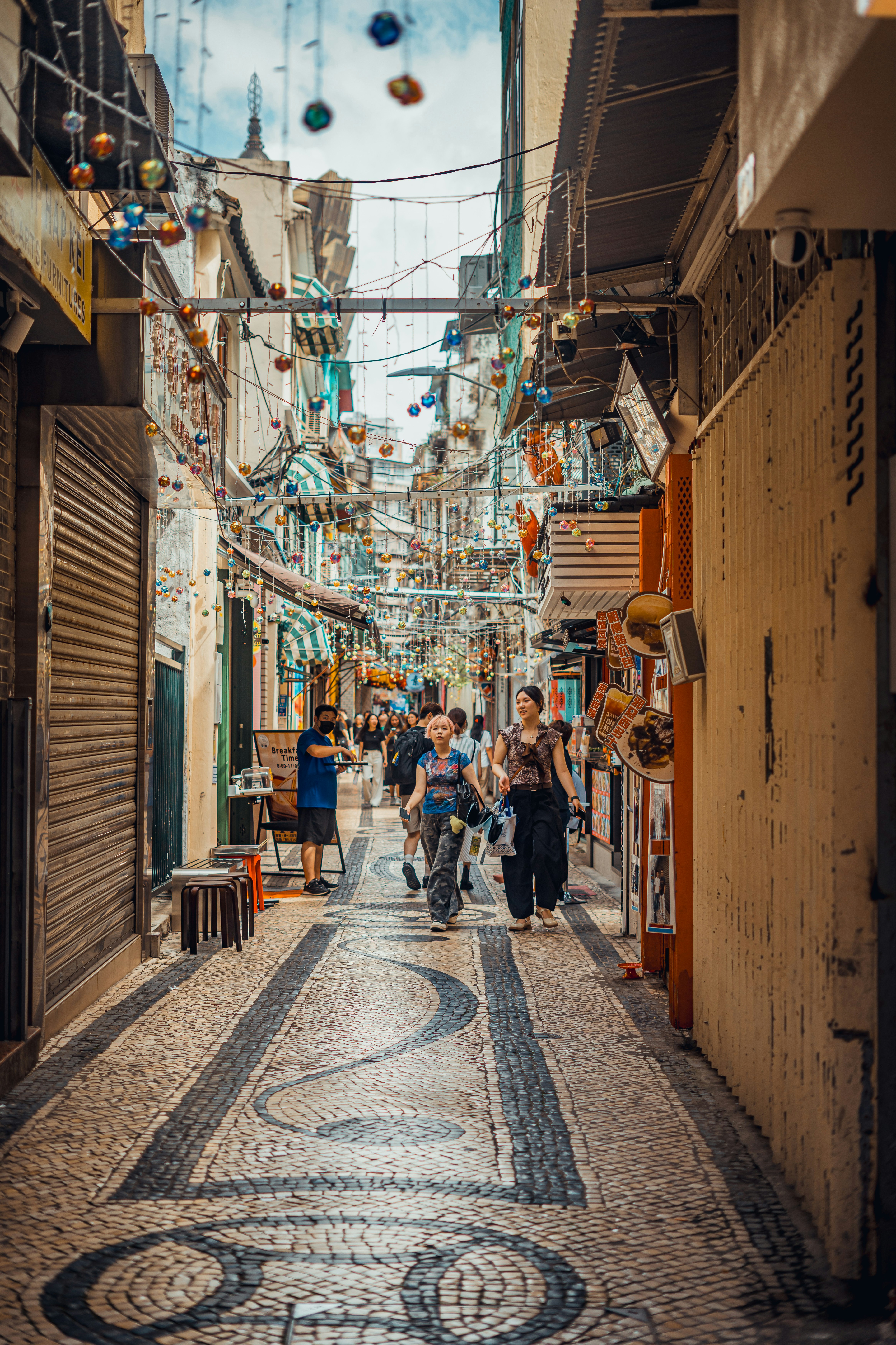 Laneways of Light: A sunlit promenade through a mosaic-stone street