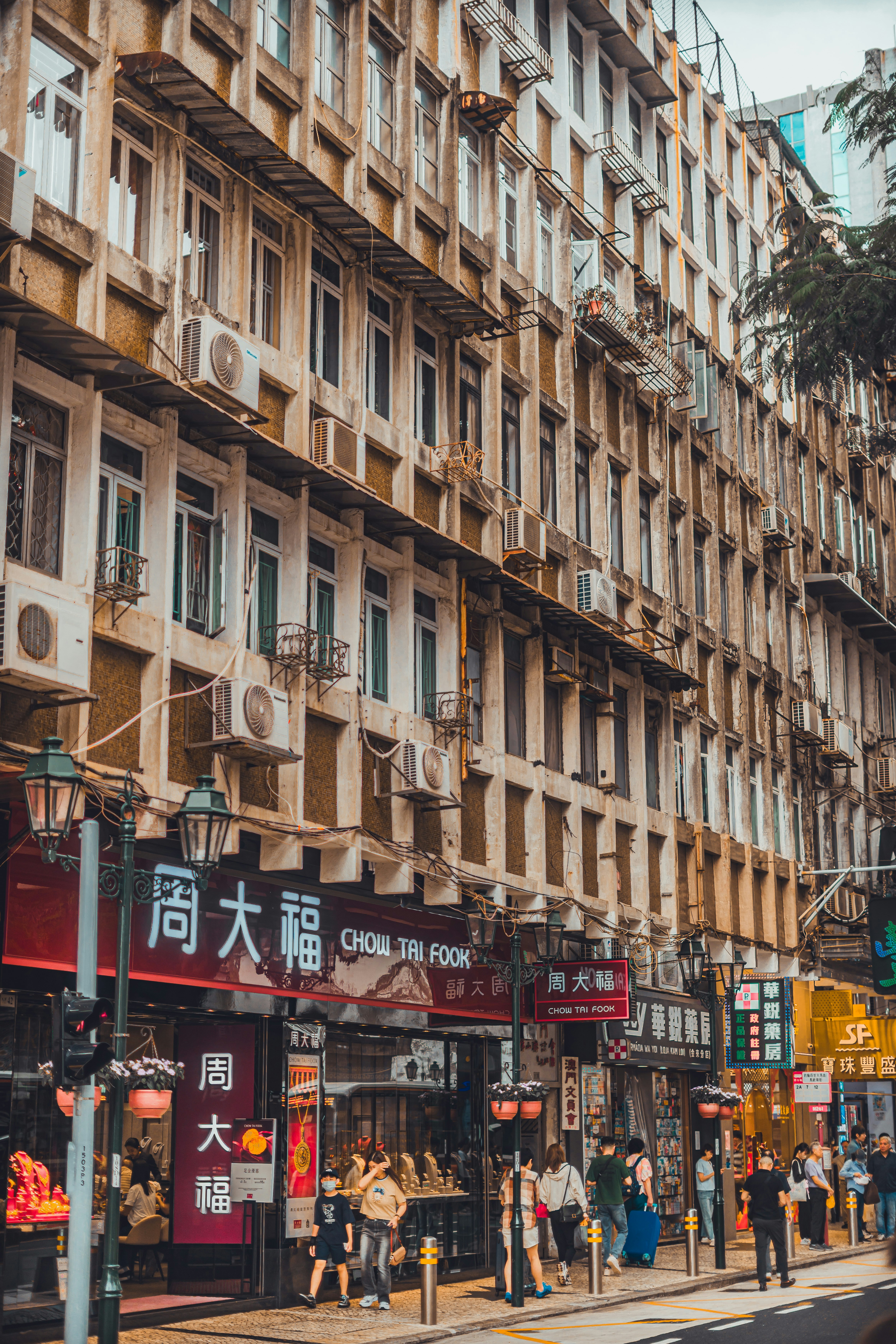 Urban Commerce: Neon Facades and Street Life on a Narrow Asian Alley