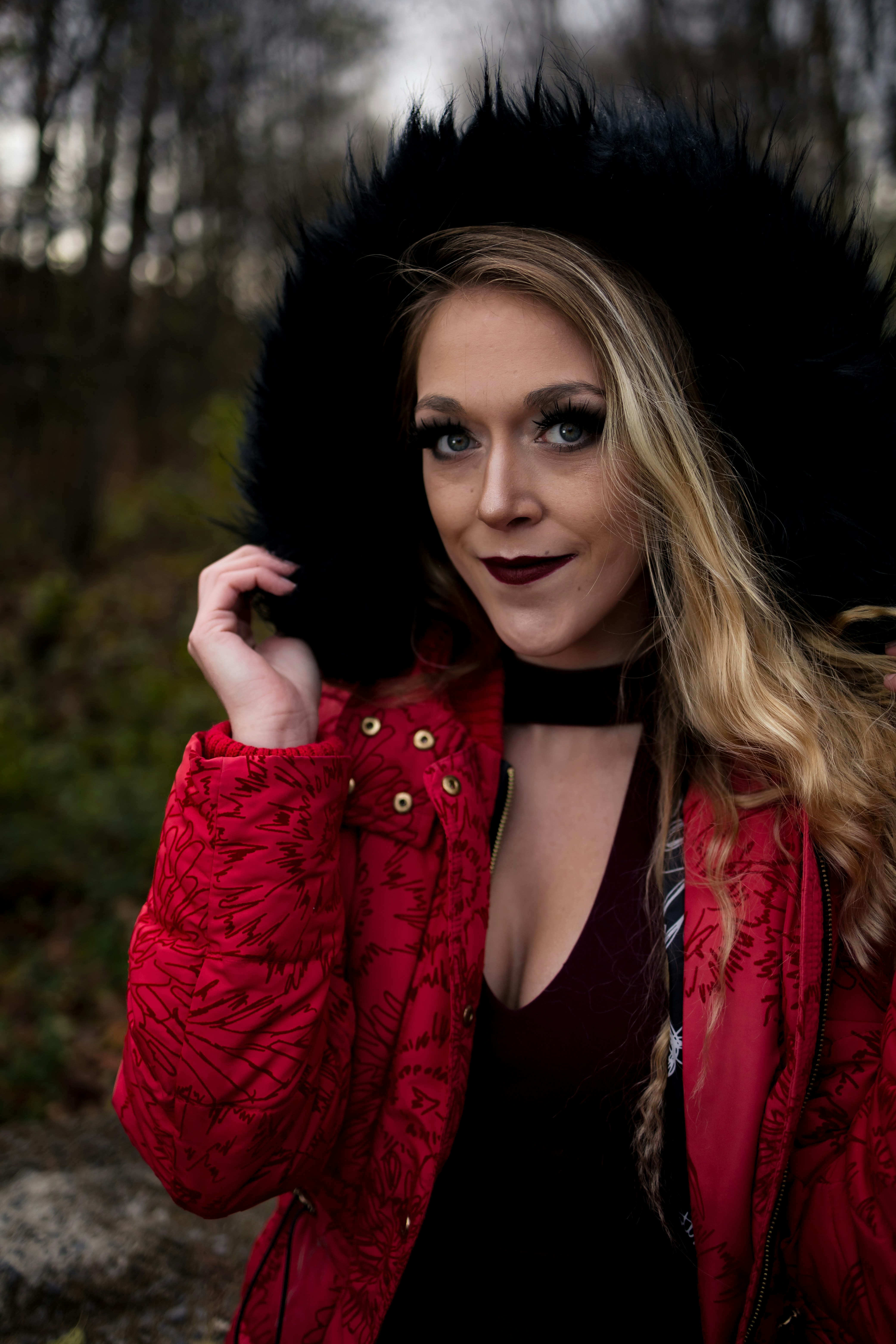 Red Velvet Hoodie, Dark Fur: Portrait in a Quiet Forest
