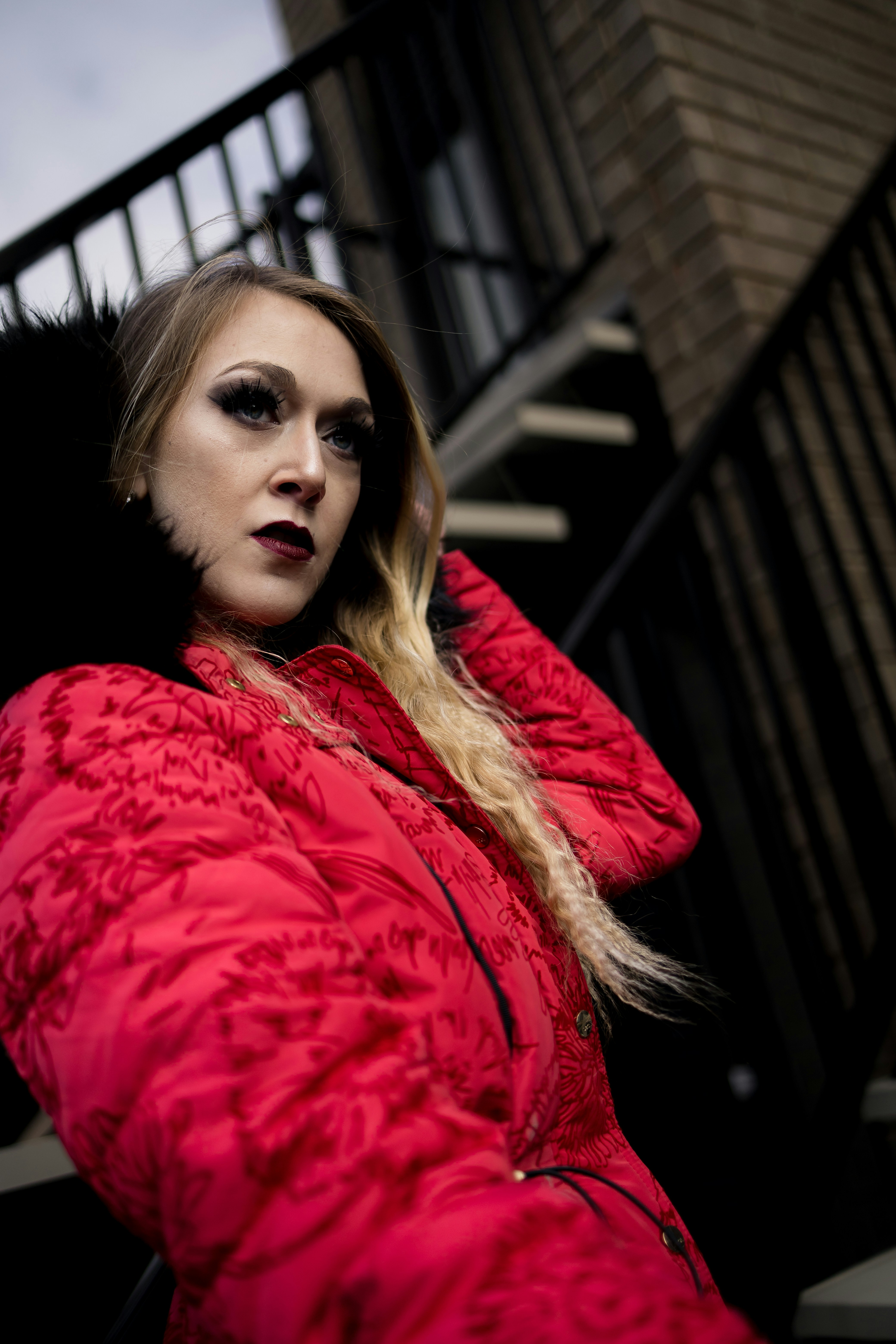 Crimson Coat, Quiet Gaze