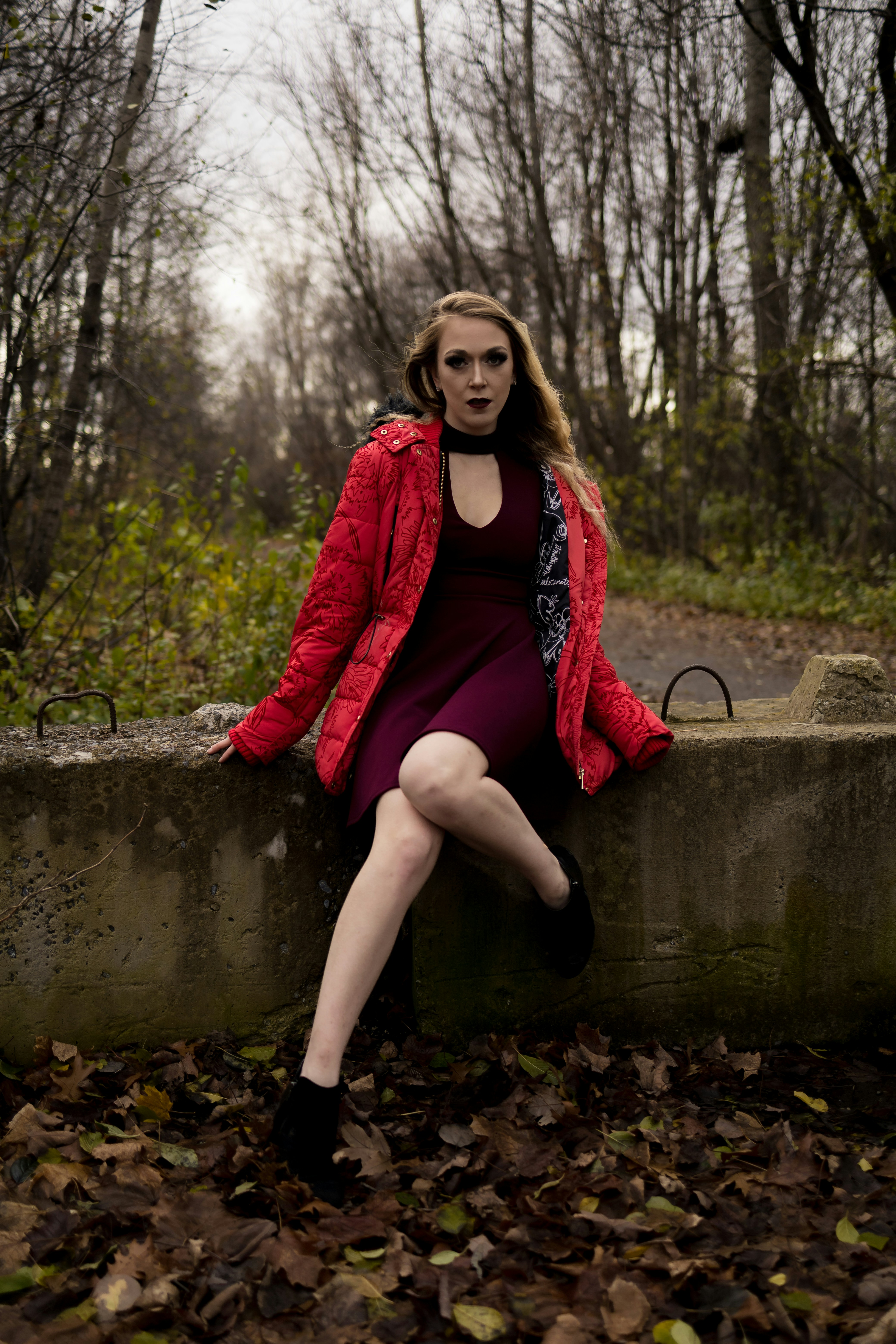 Red Winter Edge: A Confident Portrait in the Forest