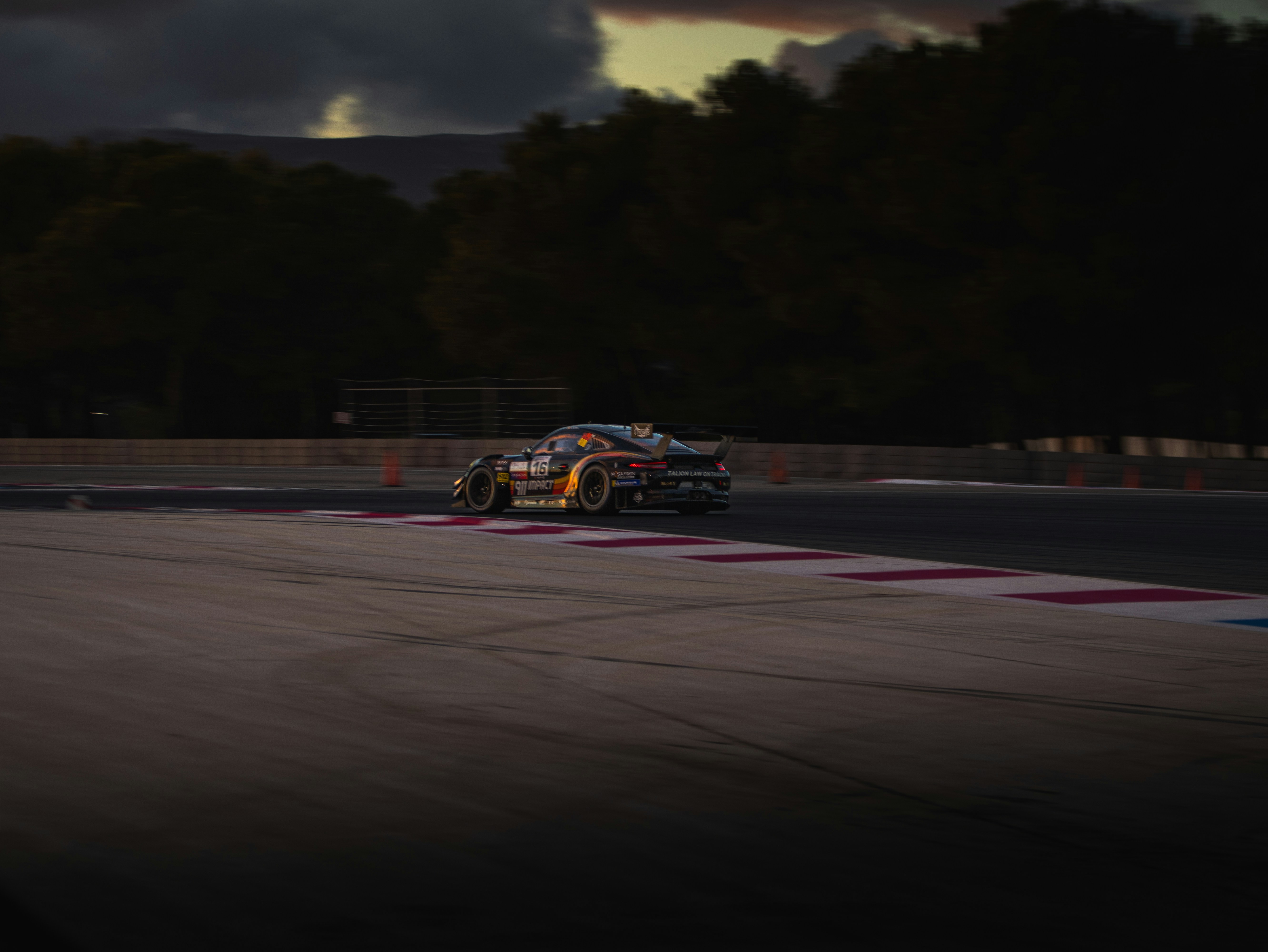 Low-light Thrill: A Racing Moment in Twilight