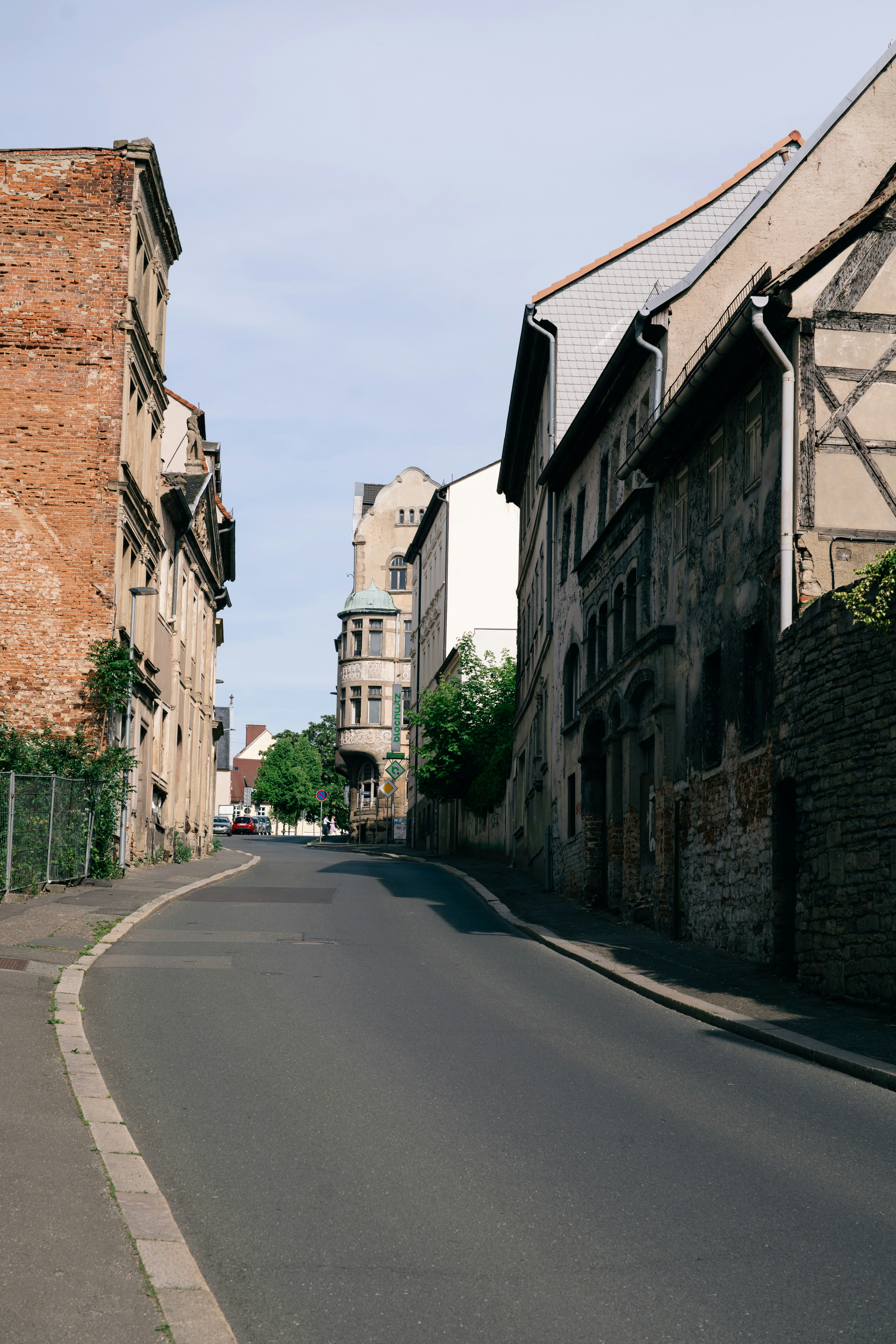 Cobbled Corridor: A Quiet Street Between Historic Facades