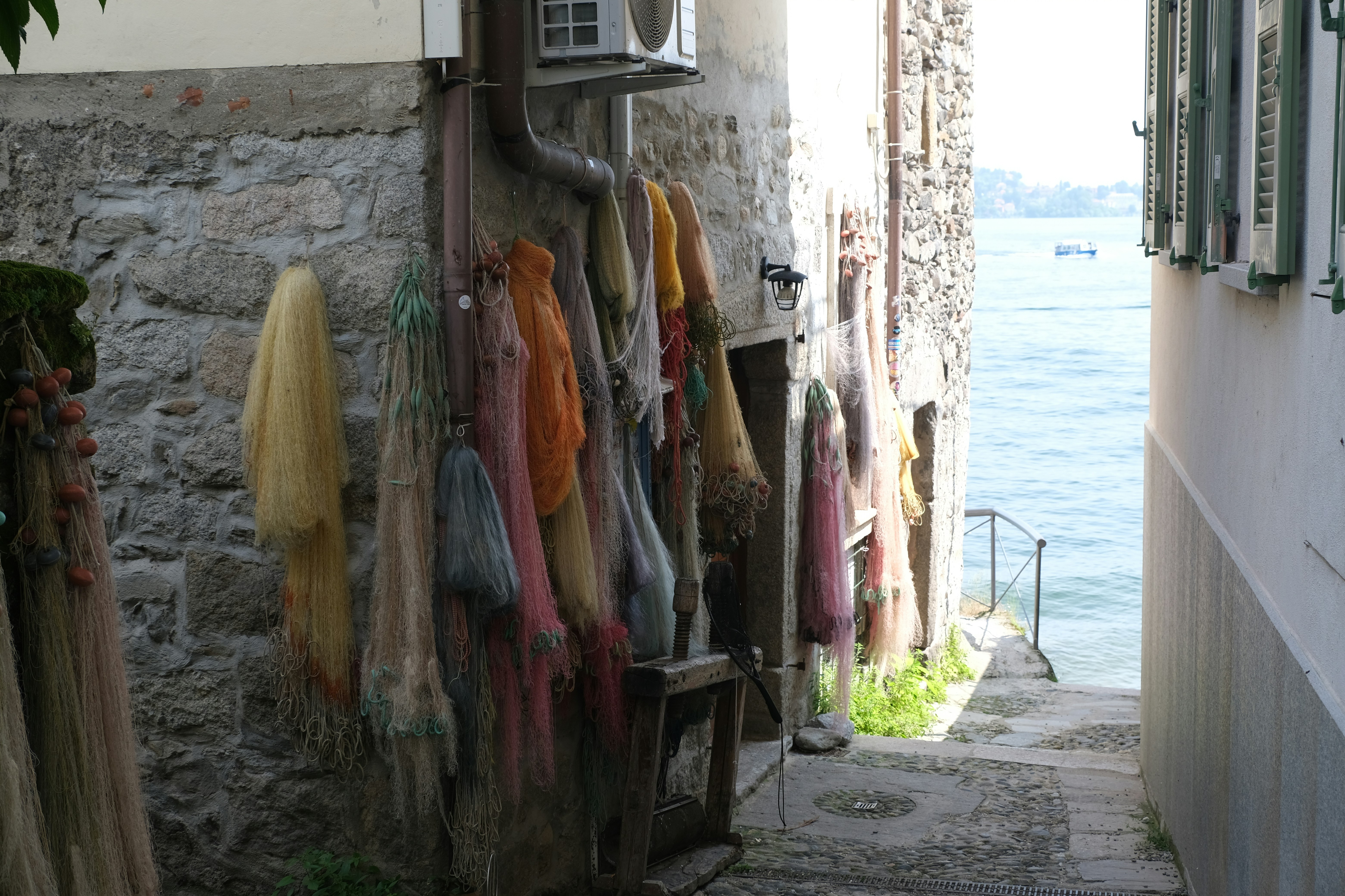 Narrow Alley of Colorful Nets by the Sea