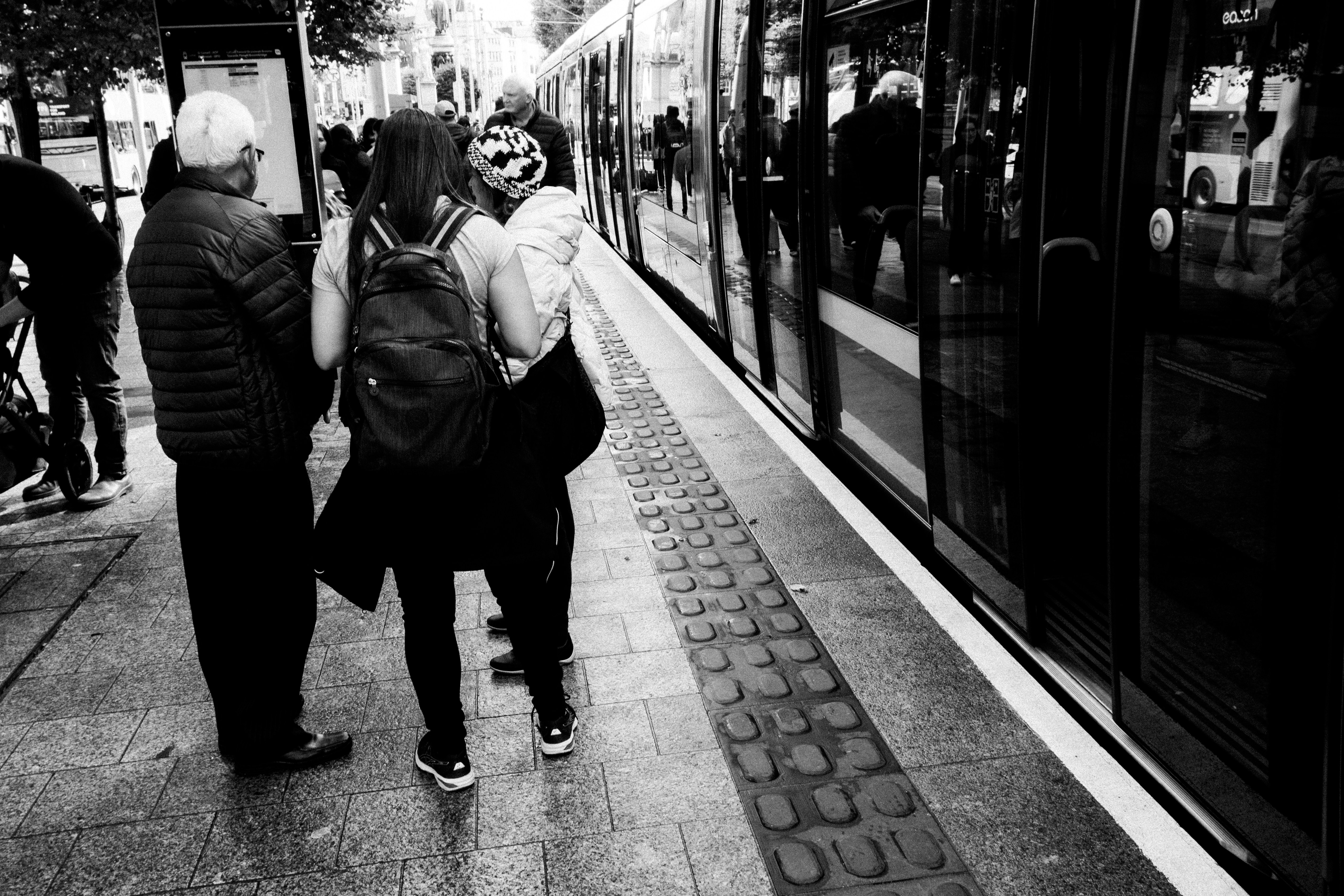 Strangers at the Stop: A Moment in the Platform Gloom