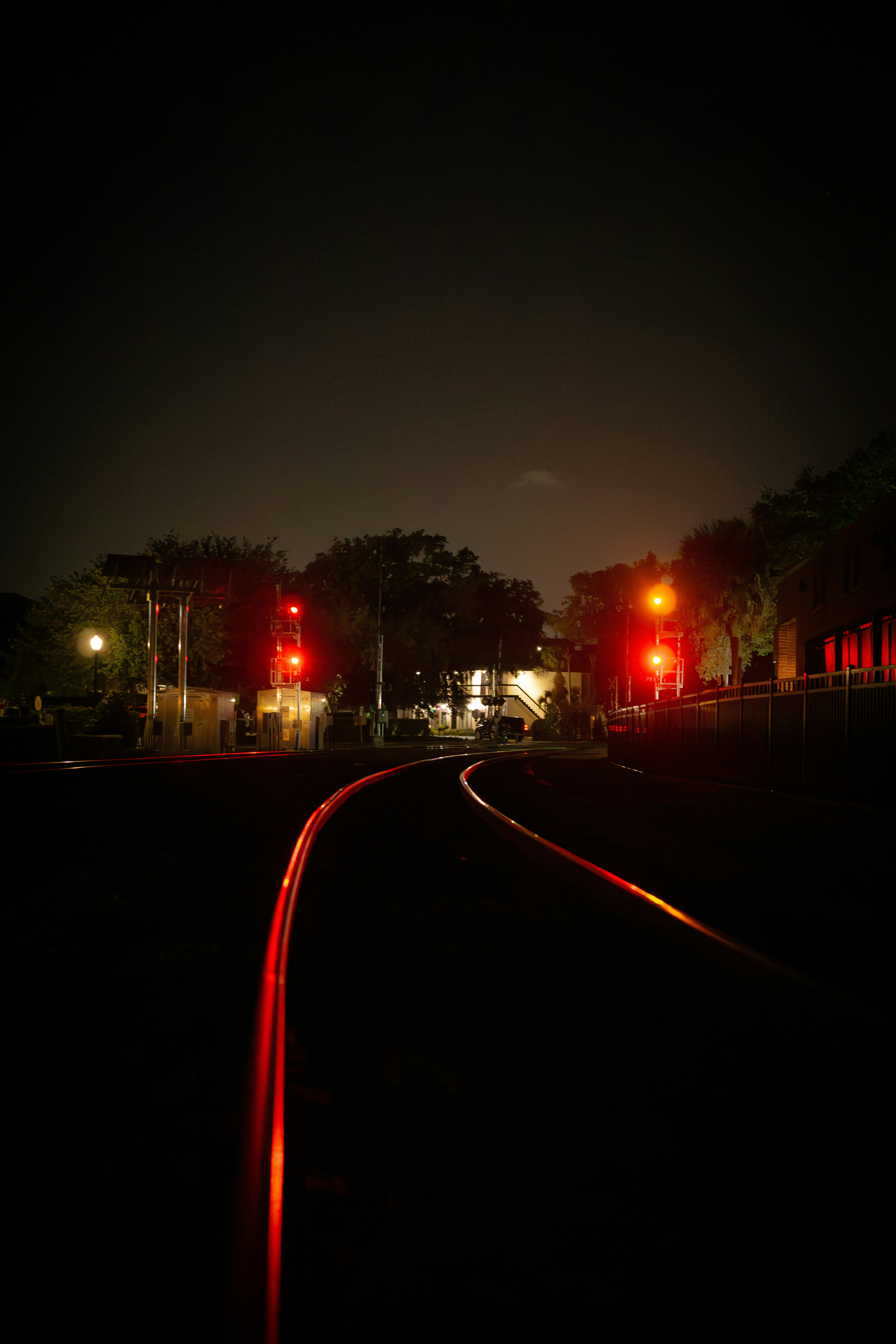 Red Rails at Dusk: A Quiet Night Run of Light Trails