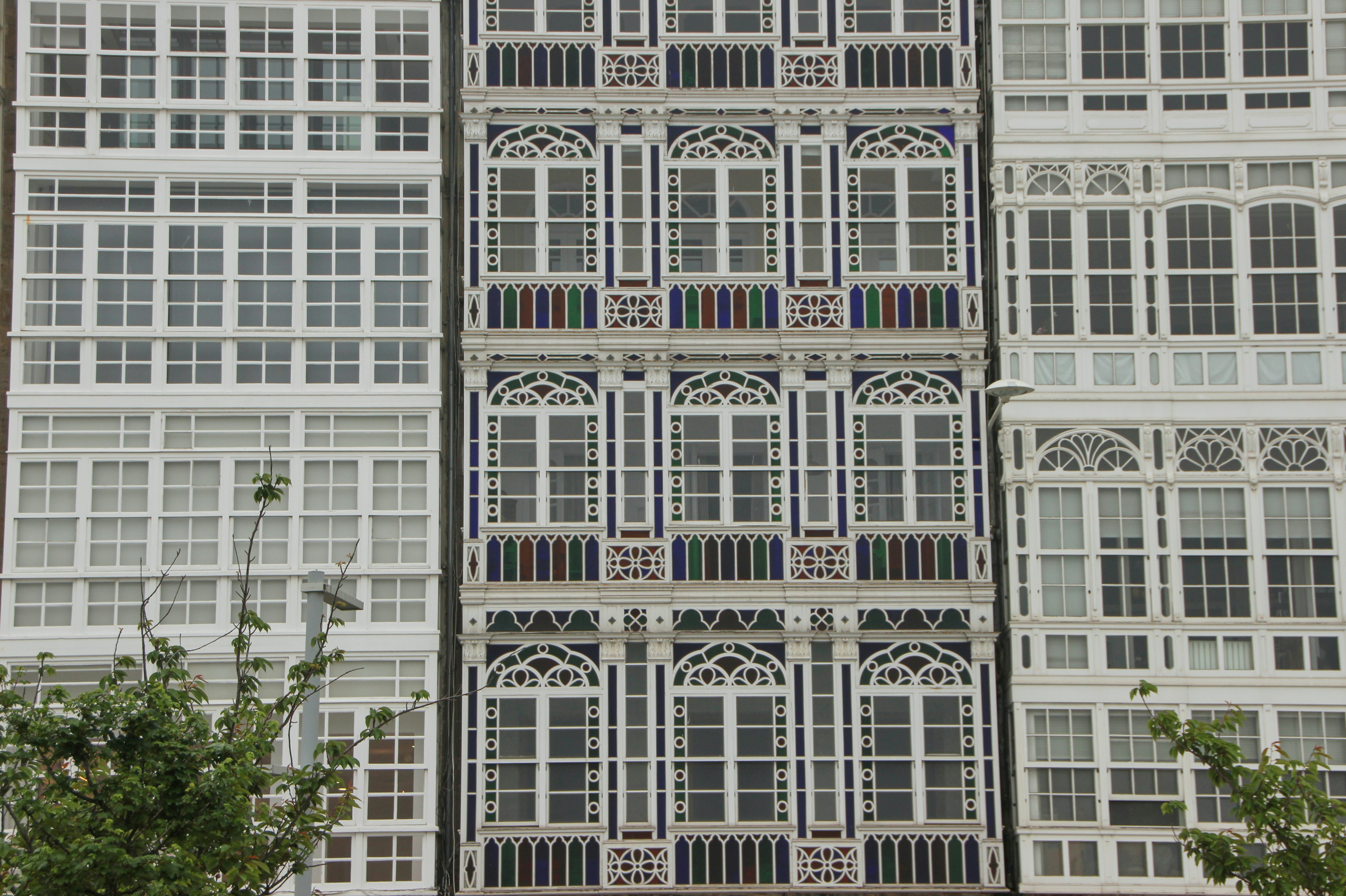 Ornate Facade Quartet: Symmetry and Windows in a Stacked Tessellation