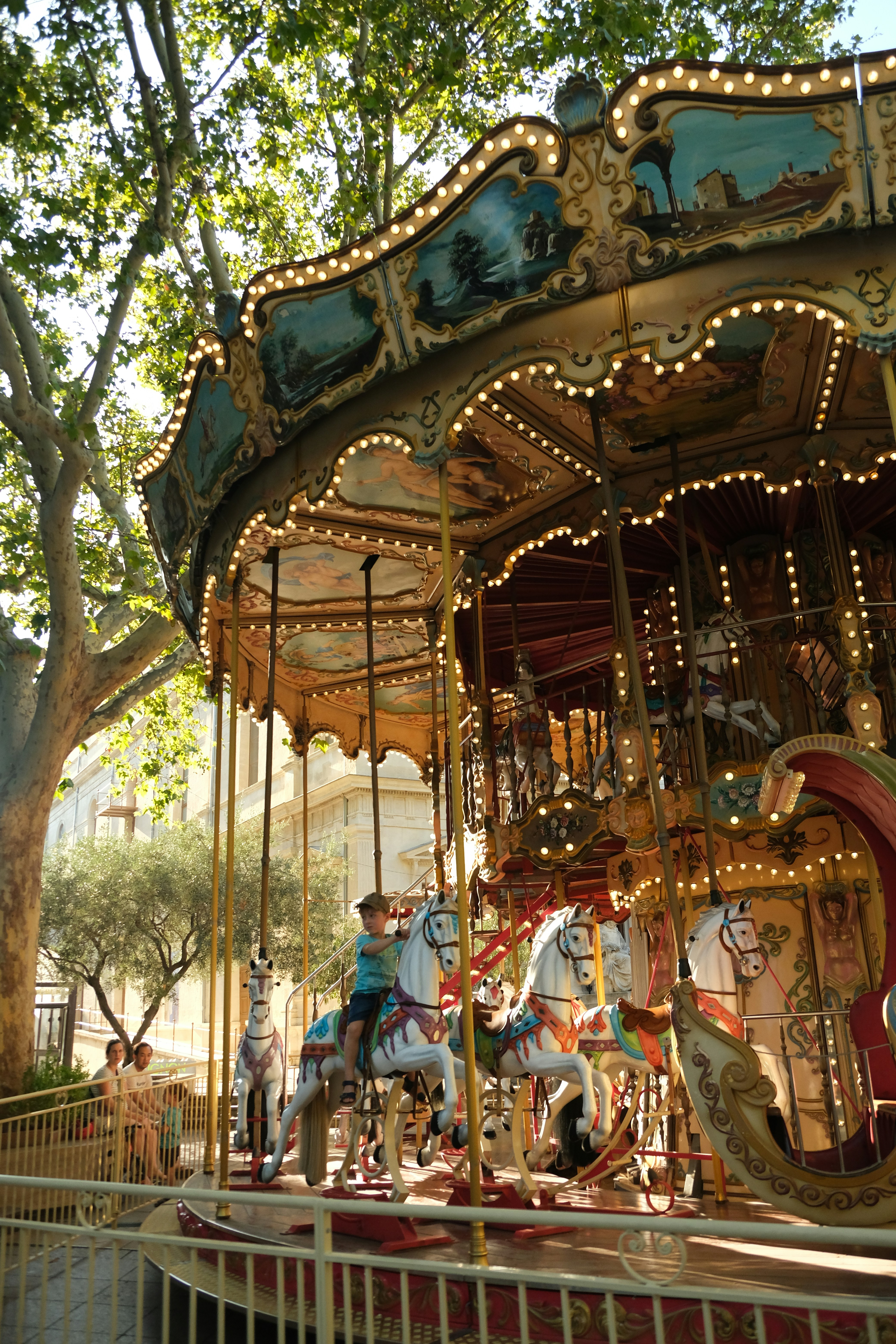 Whimsical Carousel Under Dappled Autumn Light