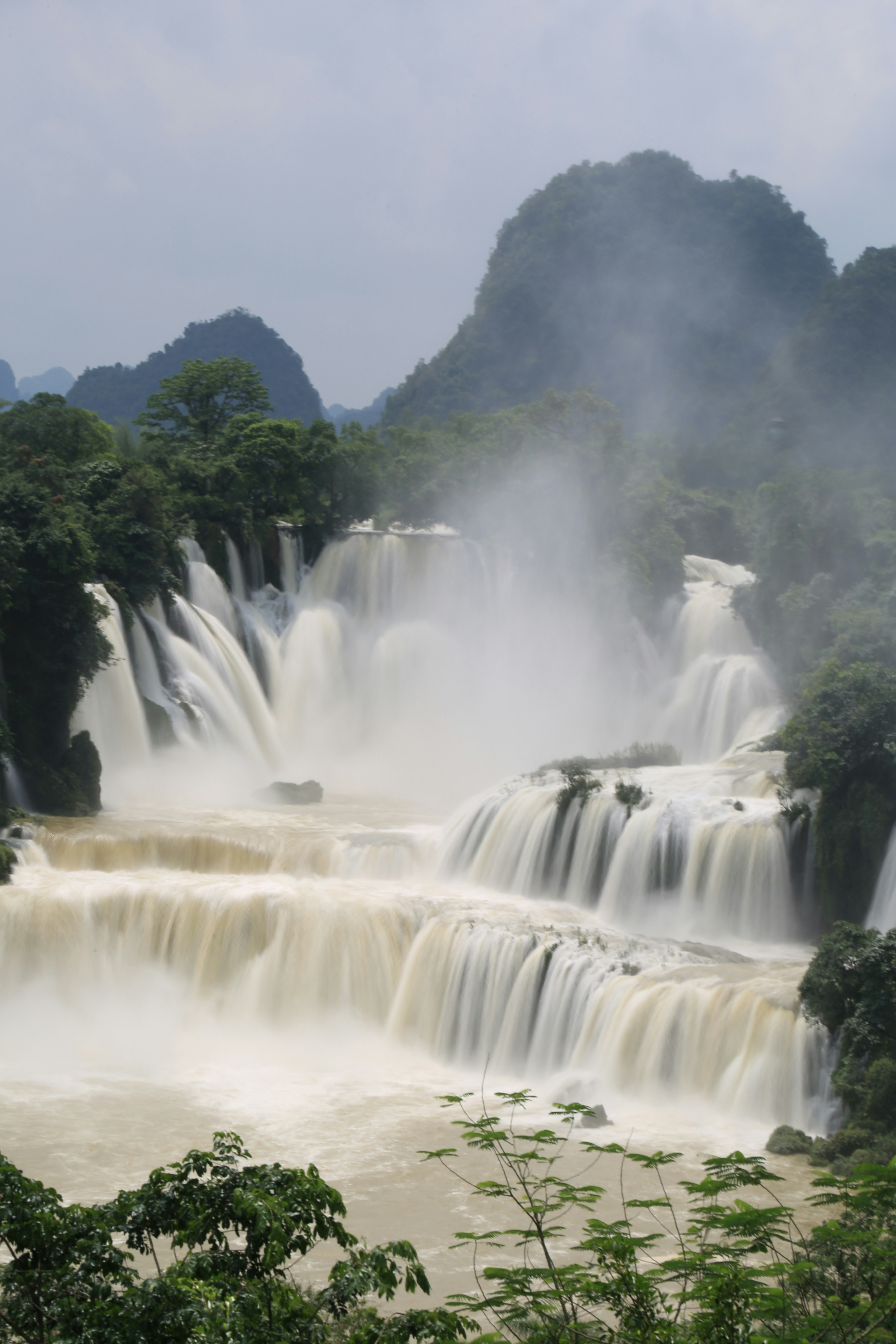 Cascade Vista: A Terraced Symphony of Water and Mist