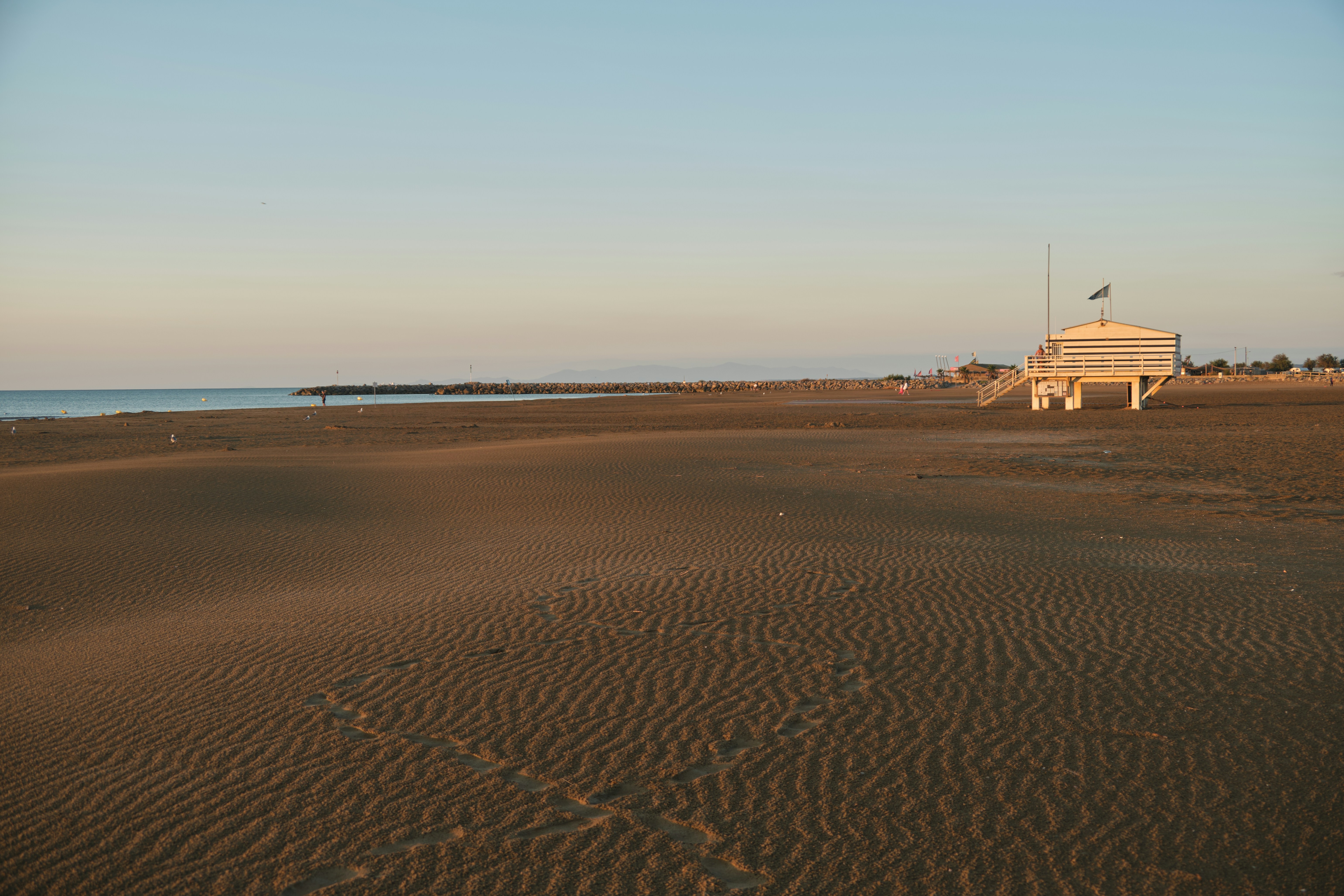 Lakeside Dunes at Dusk: Closure of the Shoreline Pier