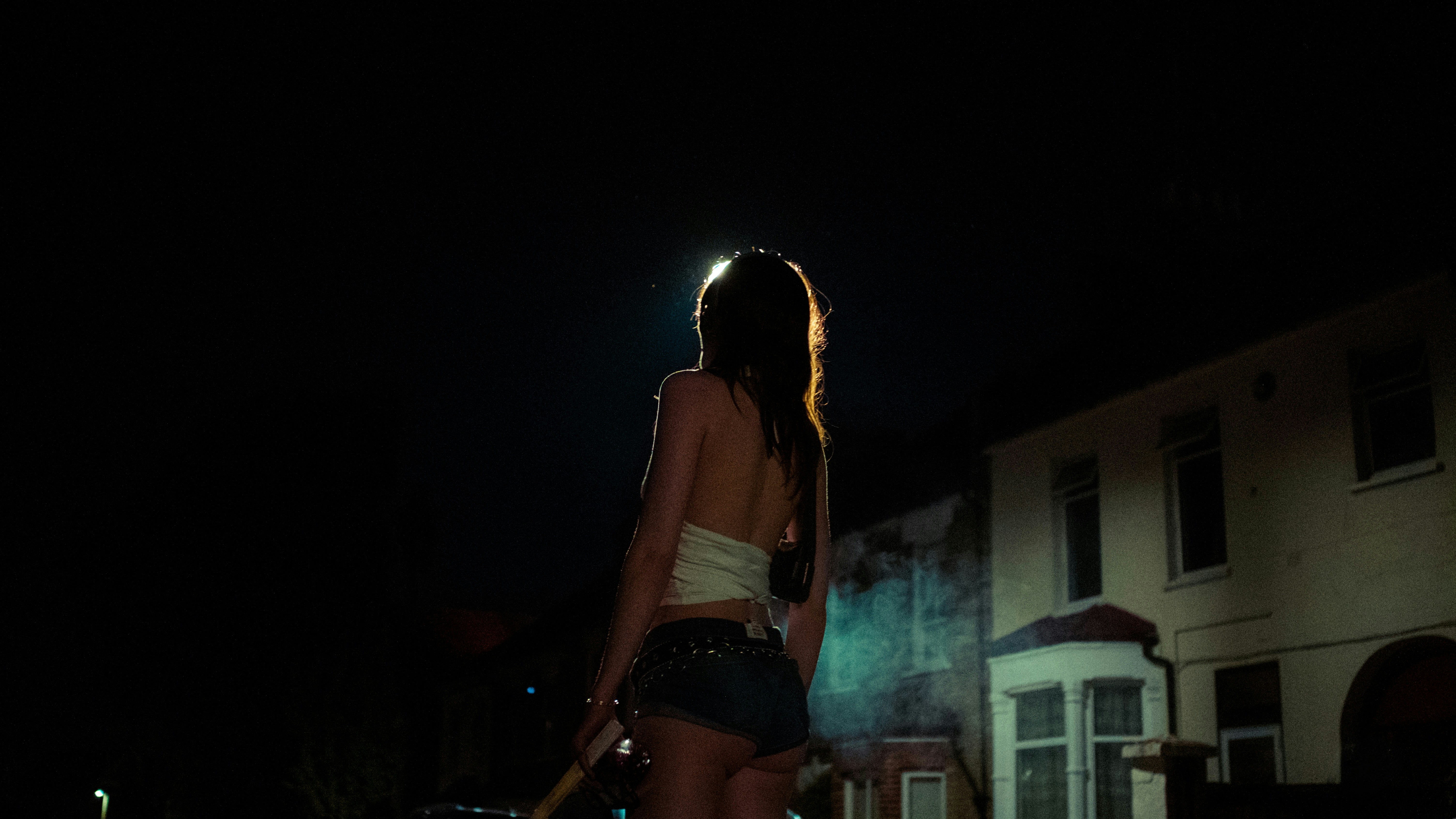 Backlit Night Walk: A silhouette with neon glow