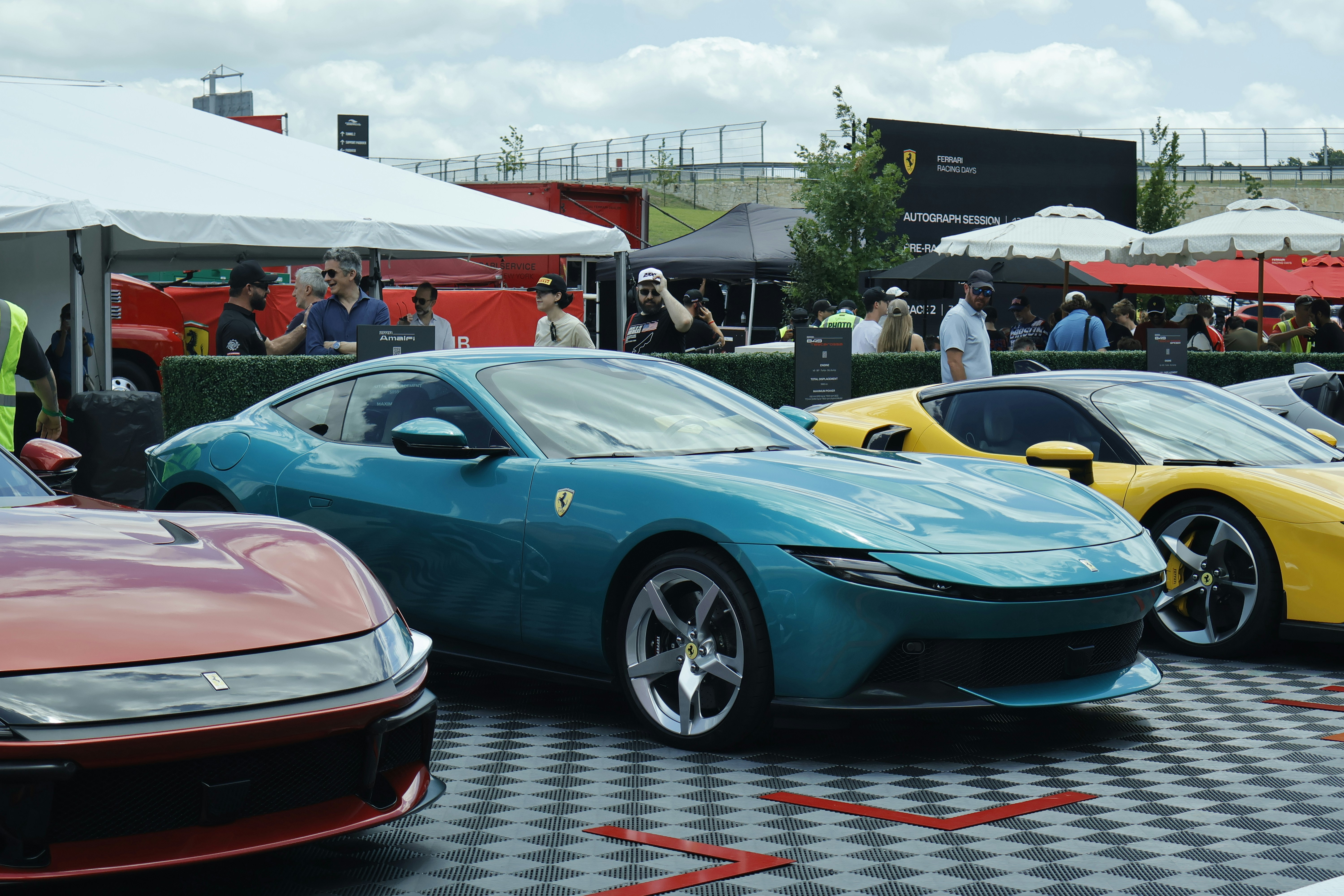 Turquoise Ferrari Stands Out Among Sunset-Hued Exotics