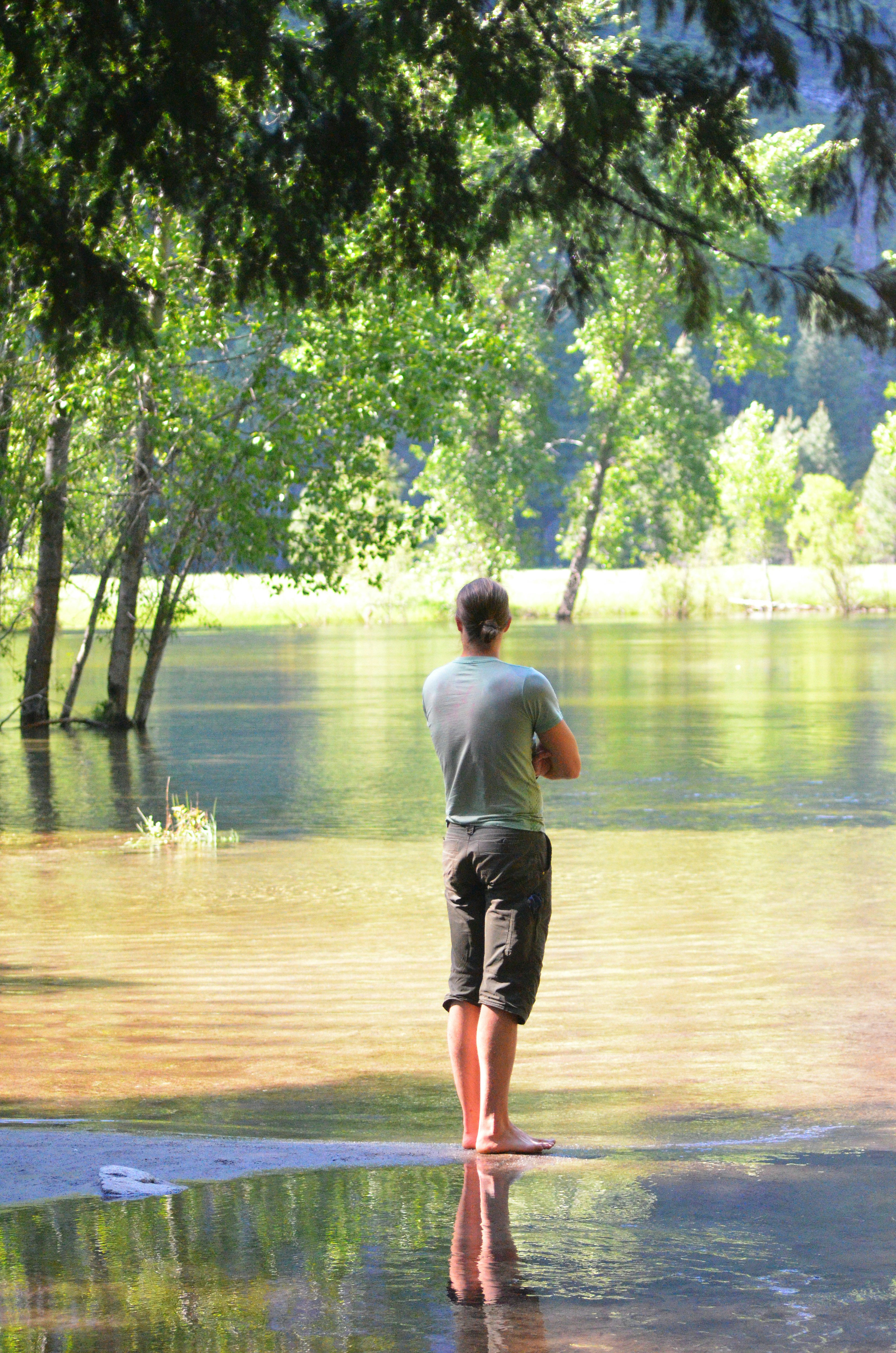 Lone Angler by the Quiet Lake