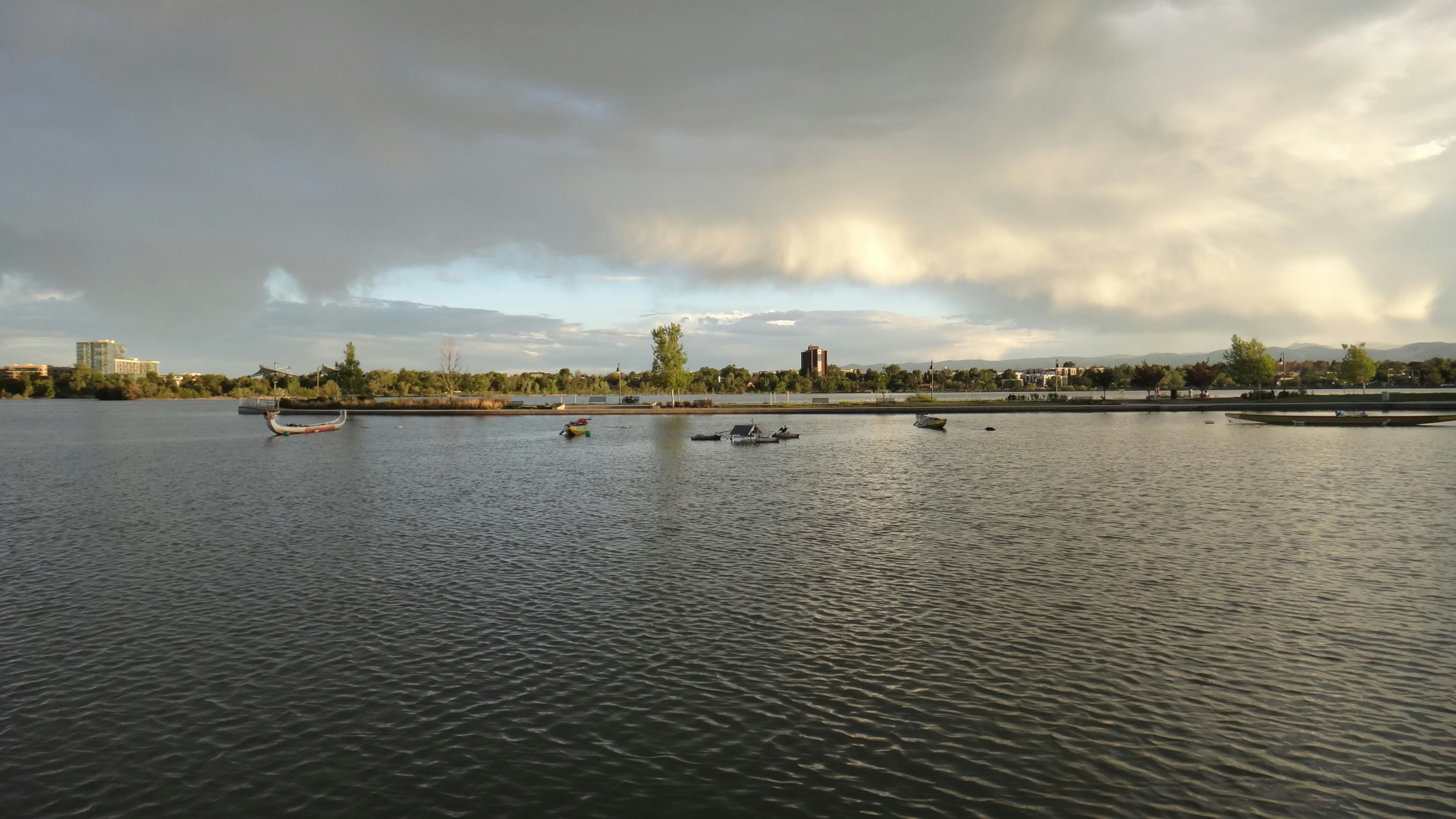 Quiet Lakeside: Boats Rest on a Broad Calm
