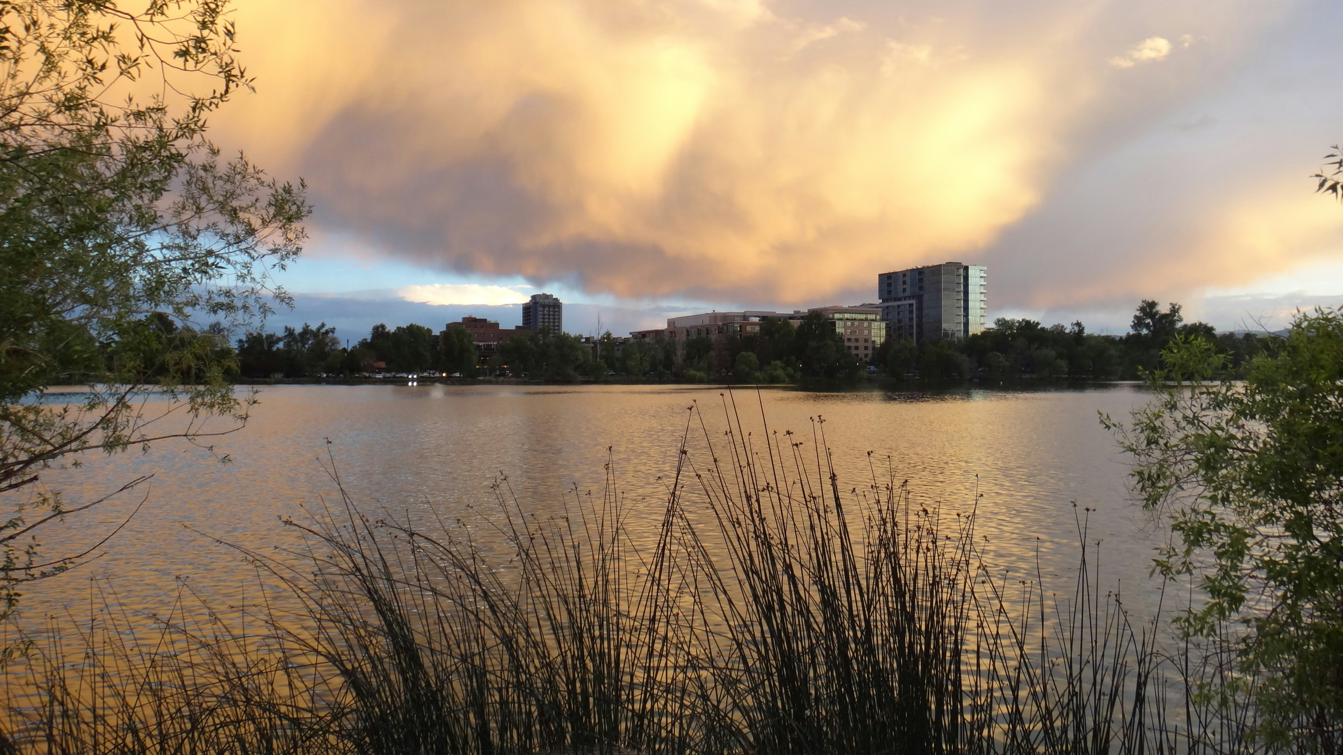Golden Clouds Over a Quiet University Lake