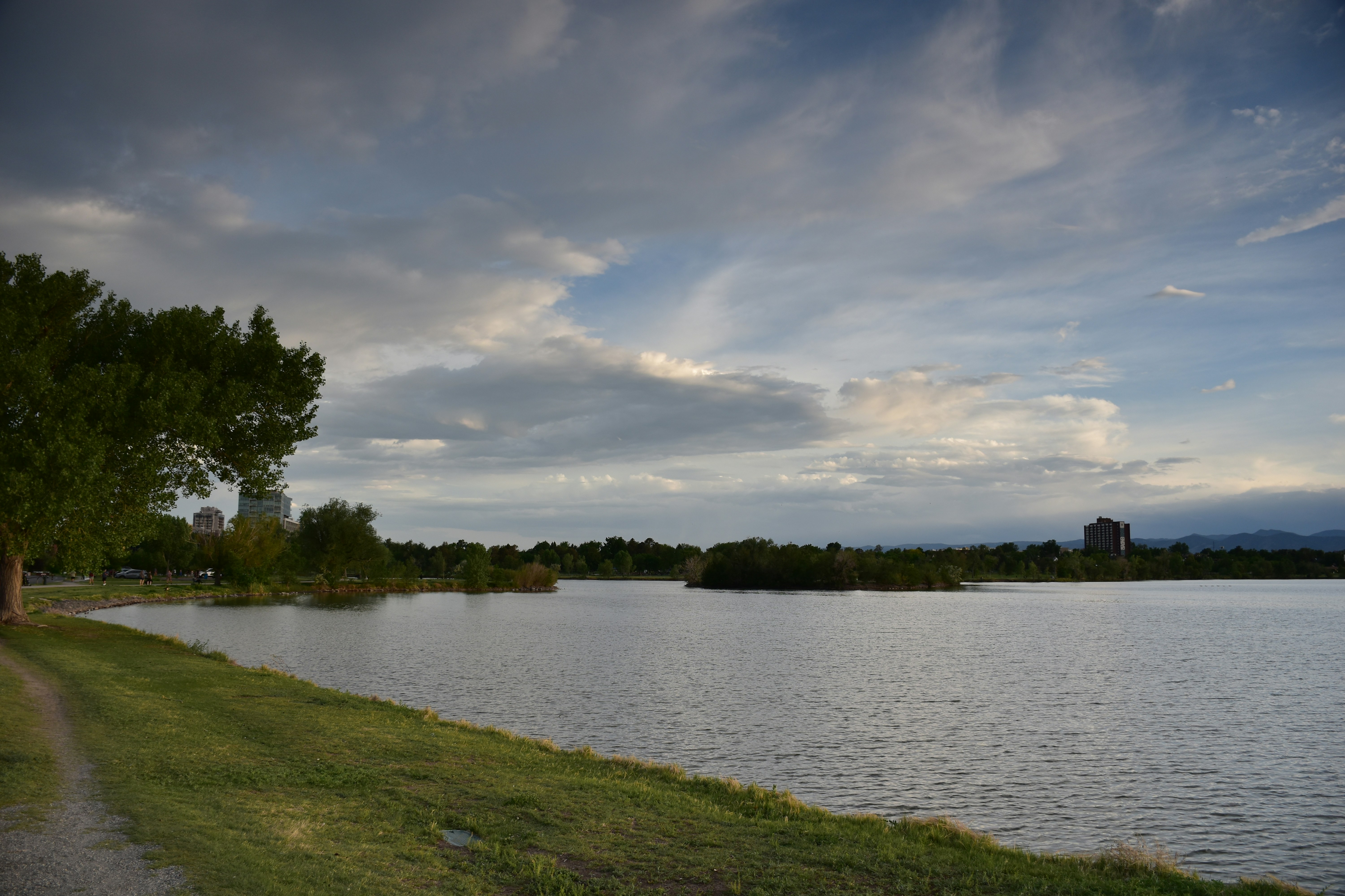 Lakeside Path under an Expansive Sky
